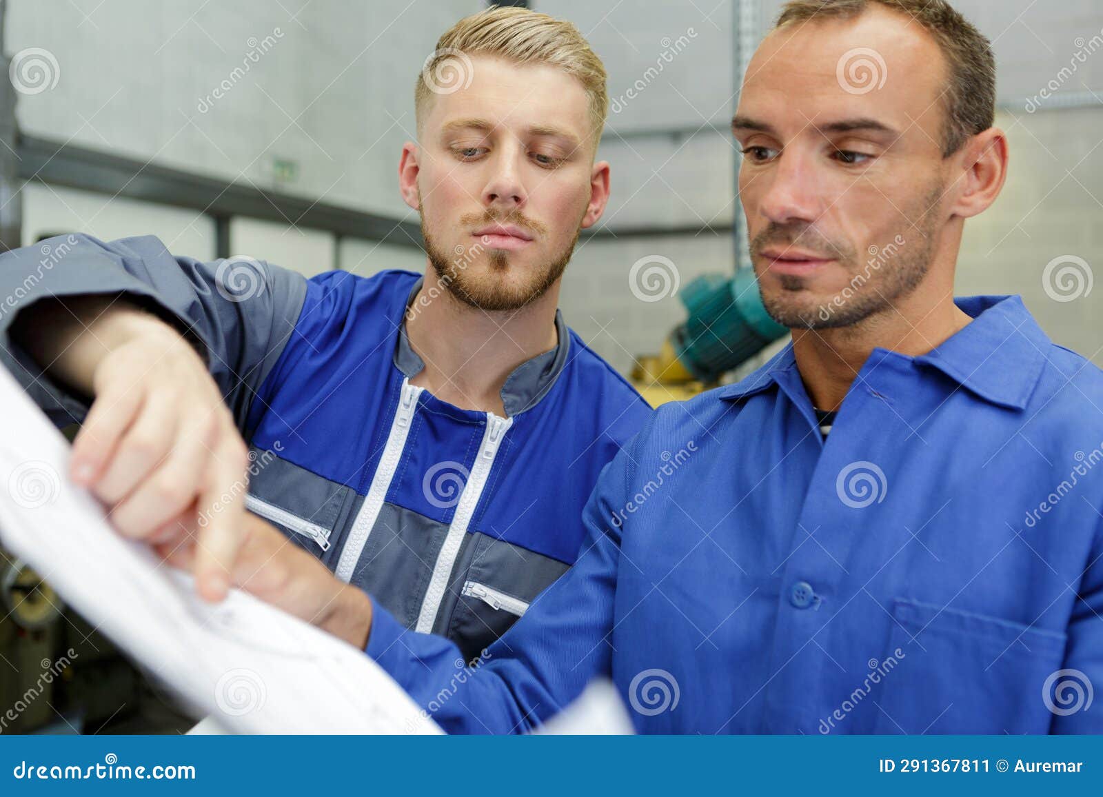 Two Workers Talking about Paper Stock Image - Image of paper, analyzing ...