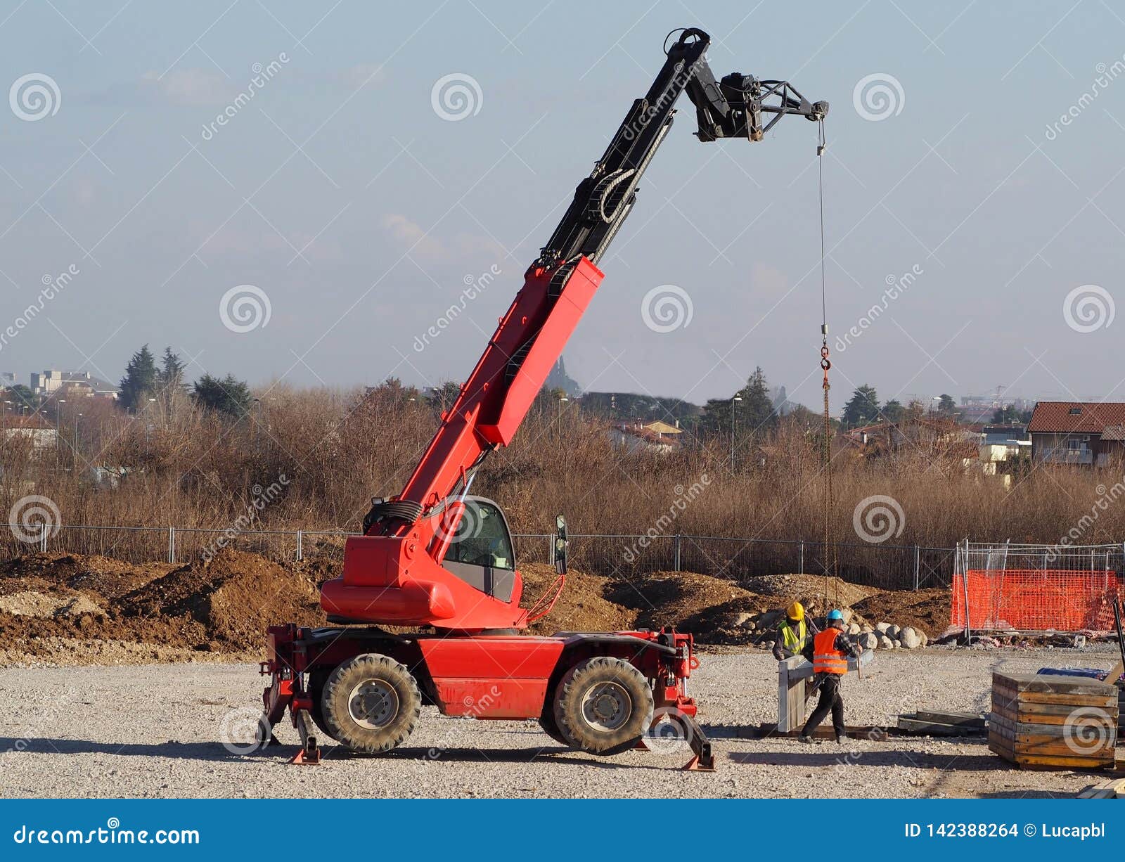Two Workers with a Telescopic Handler Loader Assemble Concrete Slabs ...