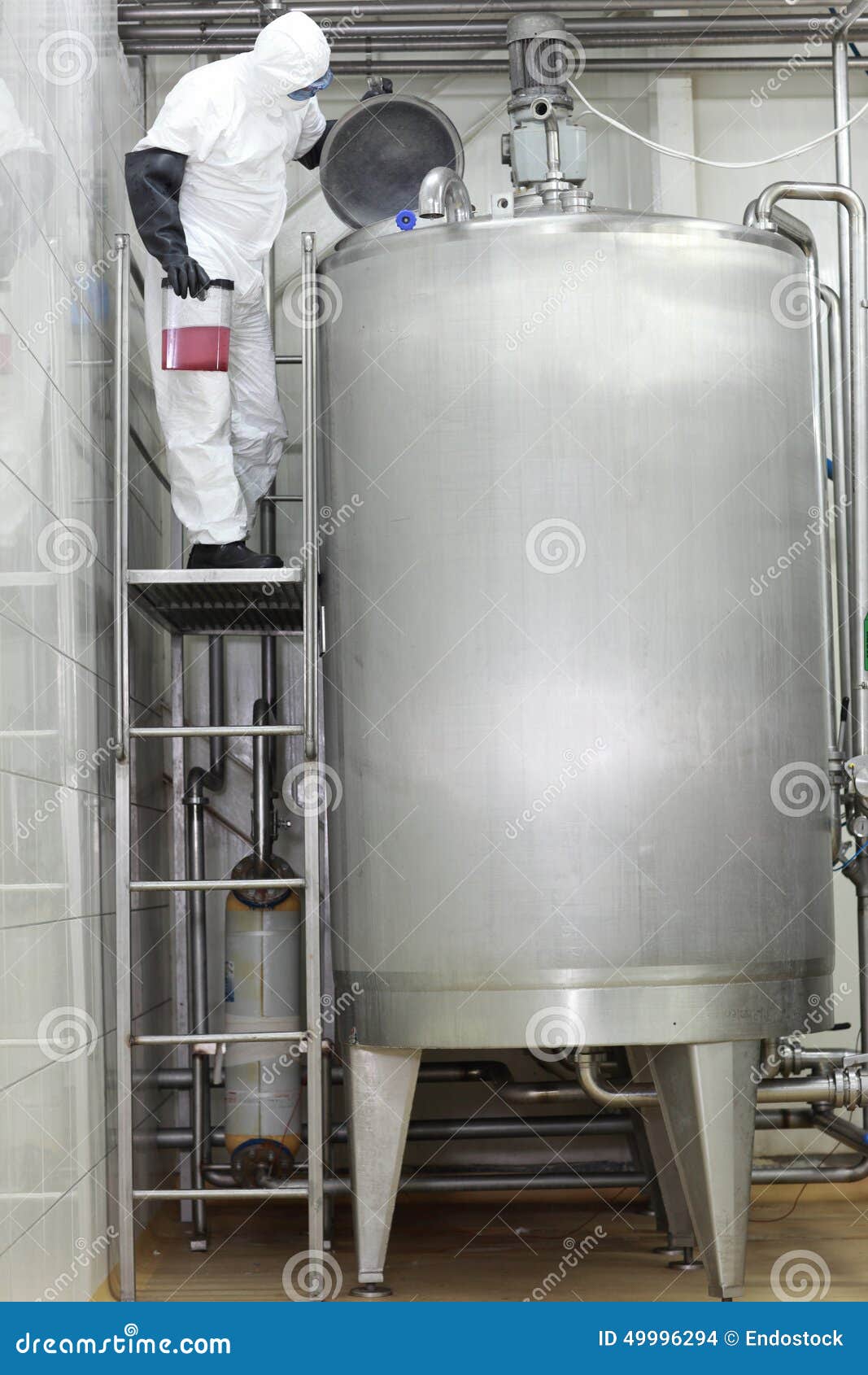 Two Workers in Uniforms at Production Line in Plant Stock Photo - Image ...