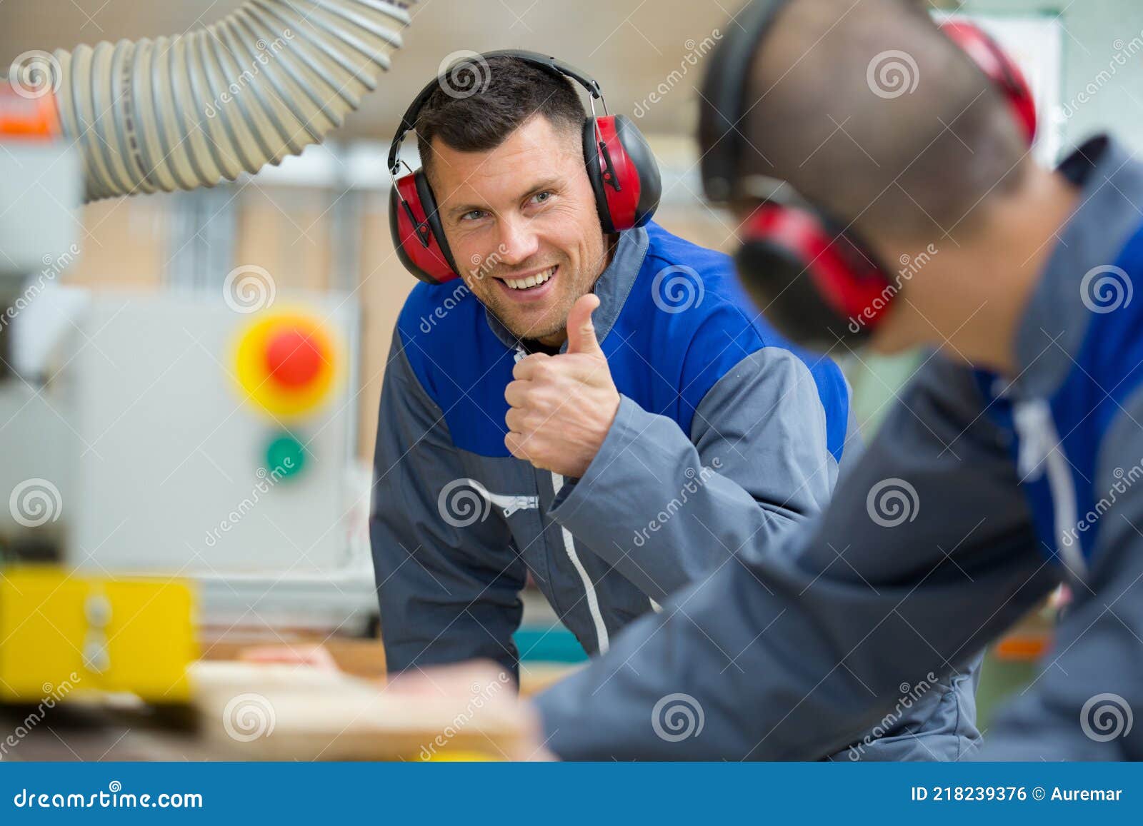 Two Workers Using Modern Machines at Factory Stock Photo - Image of ...