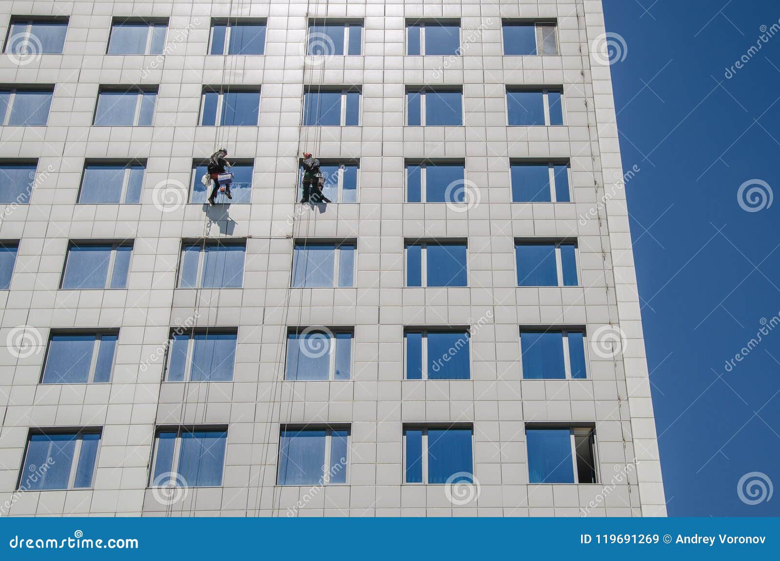 Two Workers Wash the Windows on a High-rise Building Stock Image ...