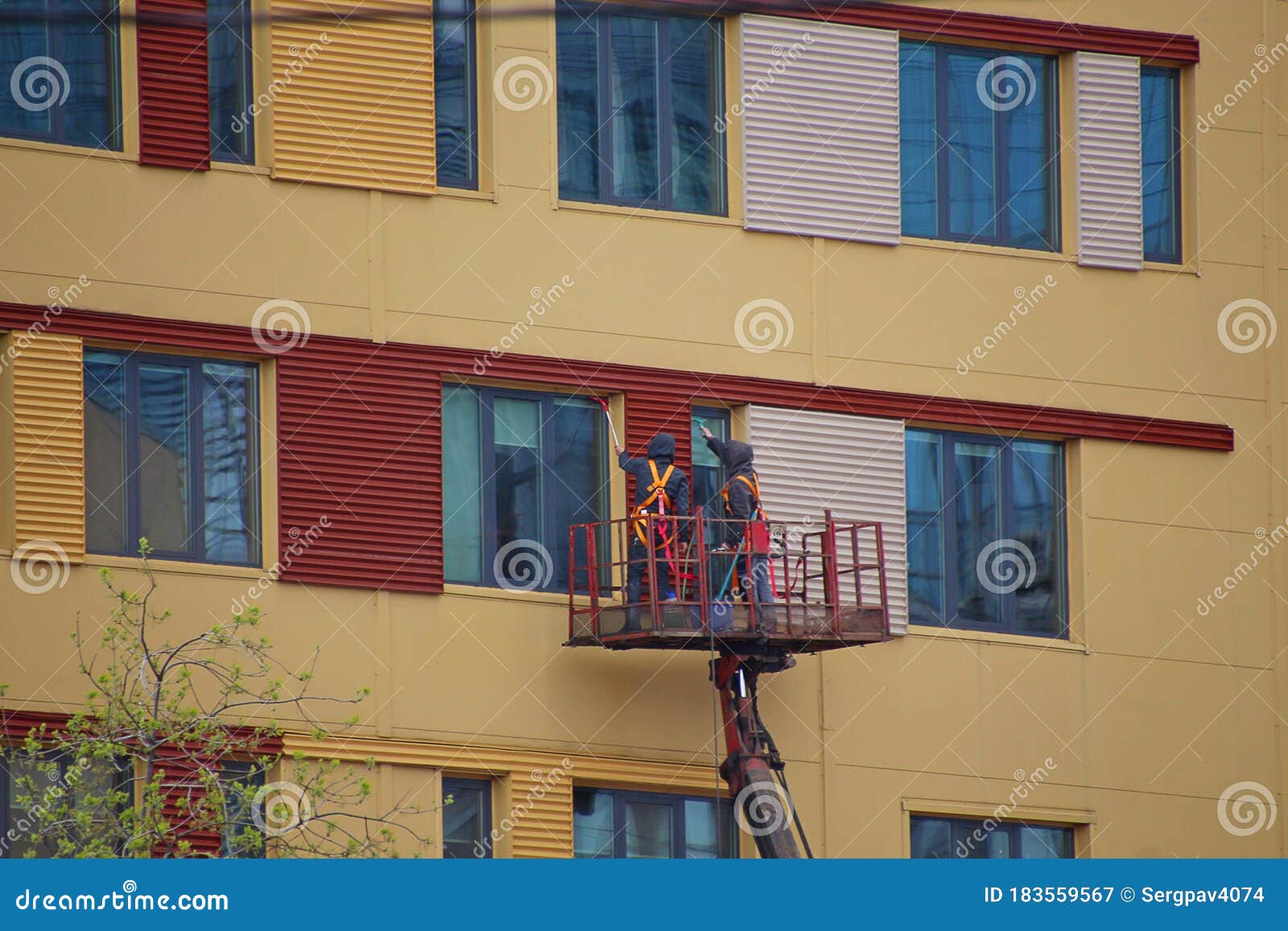 Two Workers Wash Windows from a Lifting Platform Stock Image - Image of ...