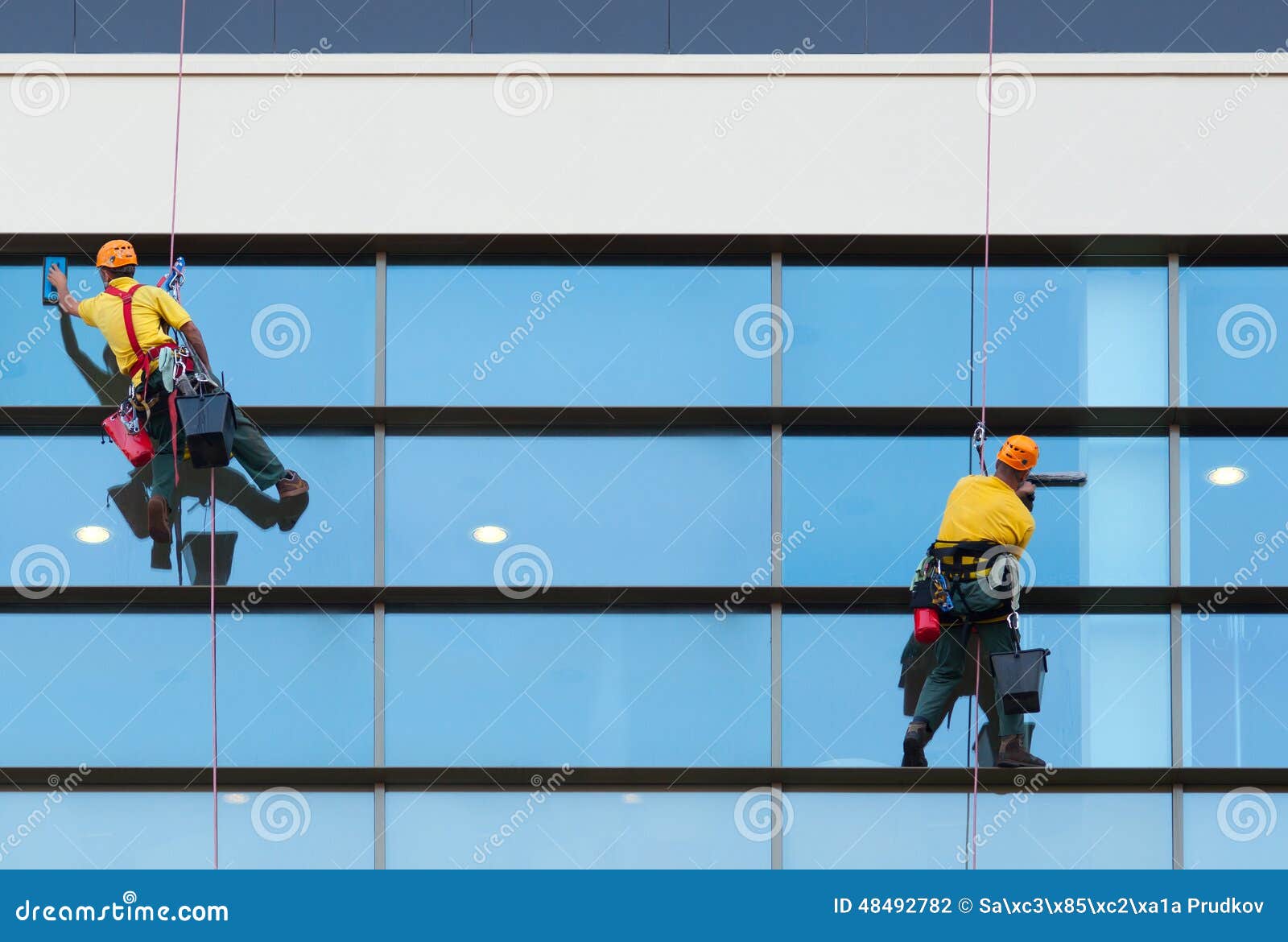 Two Workers Washing Windows of the Modern Building Stock Photo - Image ...