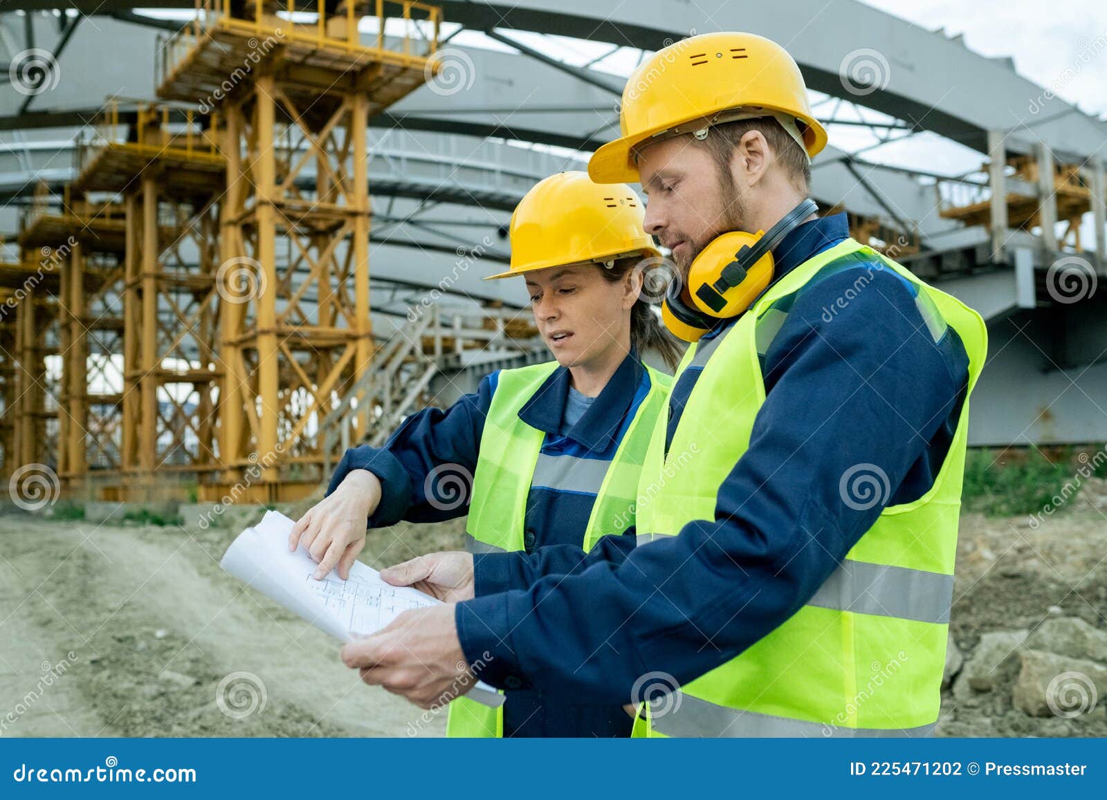People Examining Blueprint Outdoors Stock Photo - Image of standing ...