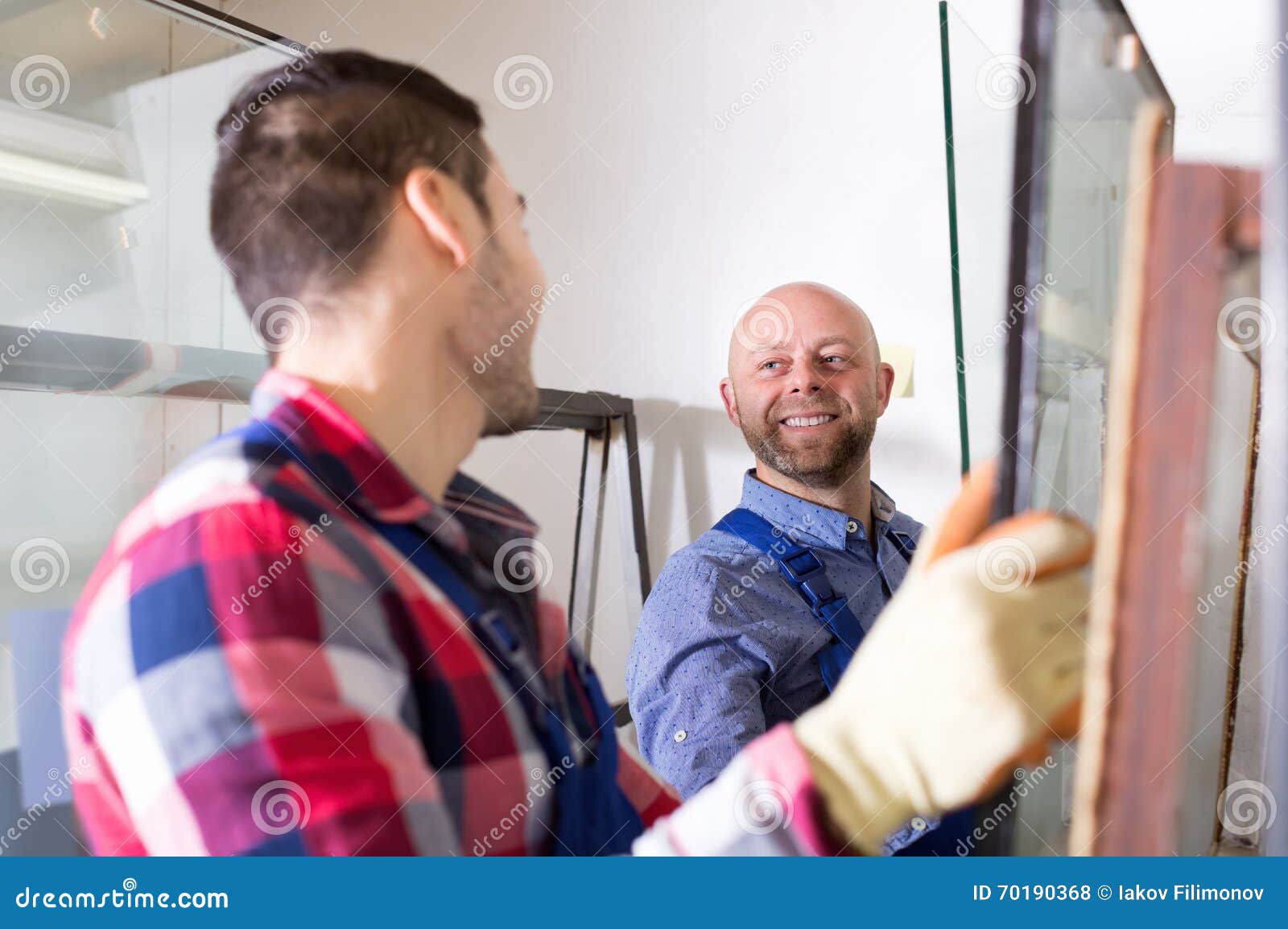 Two Workers Working with Glass Stock Photo - Image of plastic, builder ...