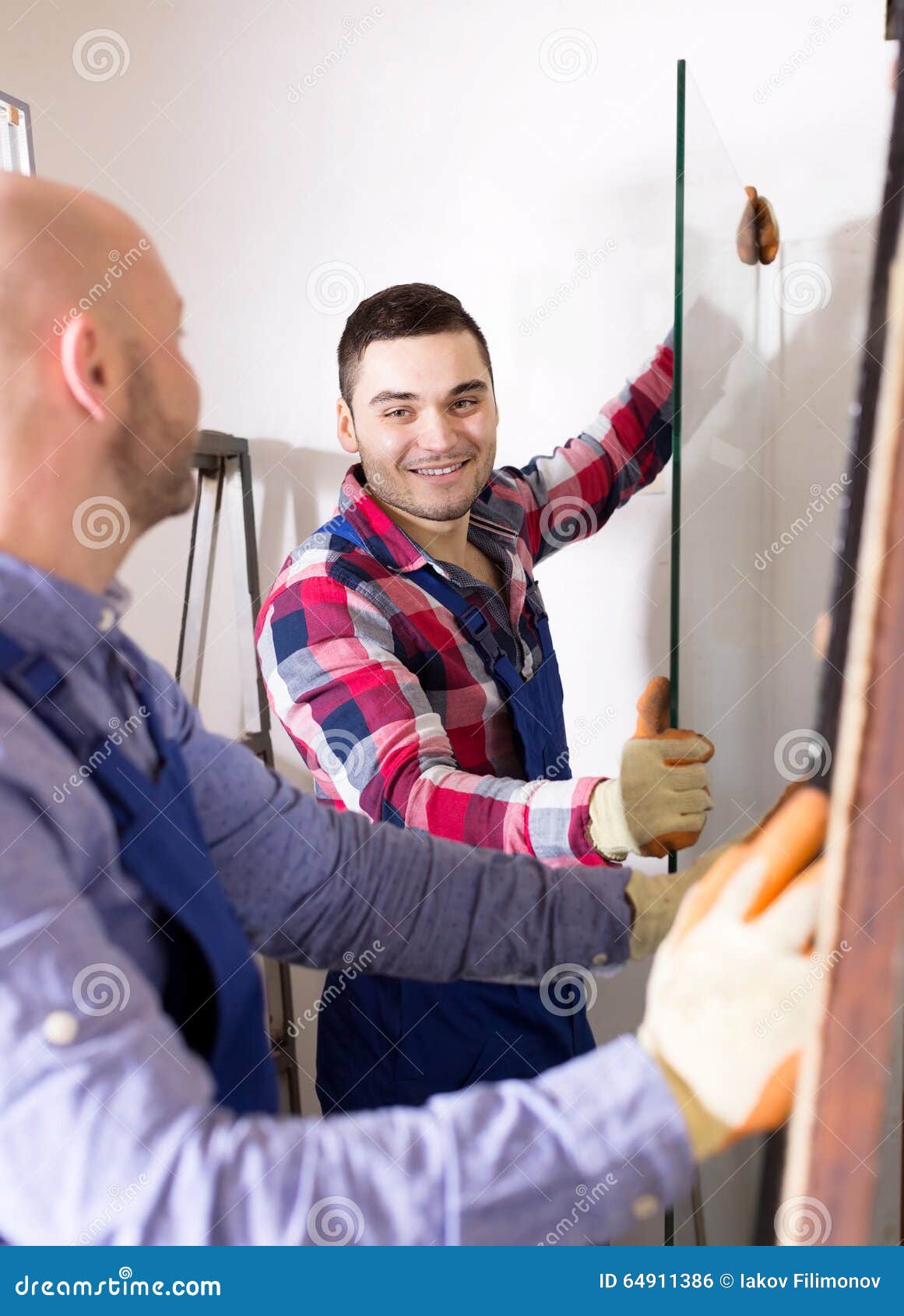 Two Workers Working with Glass Stock Photo - Image of industry, brigade ...