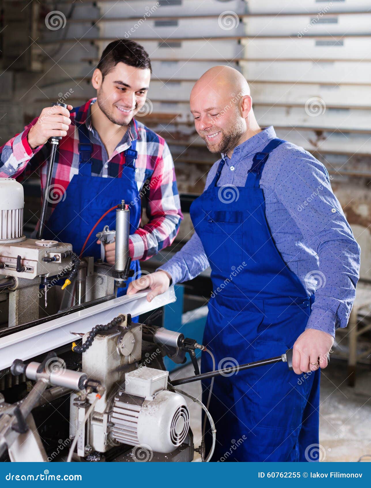 Two Workers Working on Machine Stock Image - Image of step, production ...