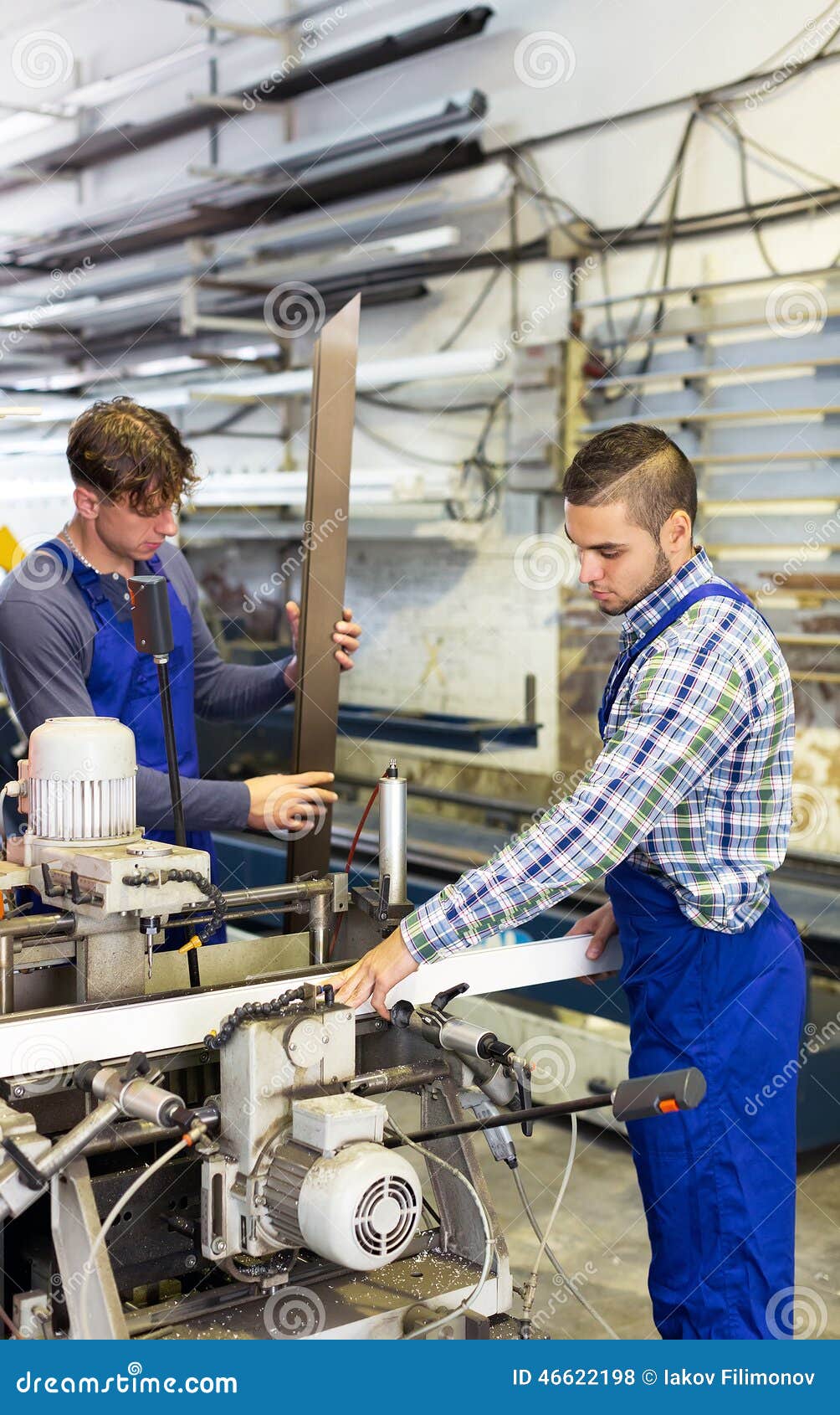 Two Workers Working on a Machine Stock Photo - Image of depository ...