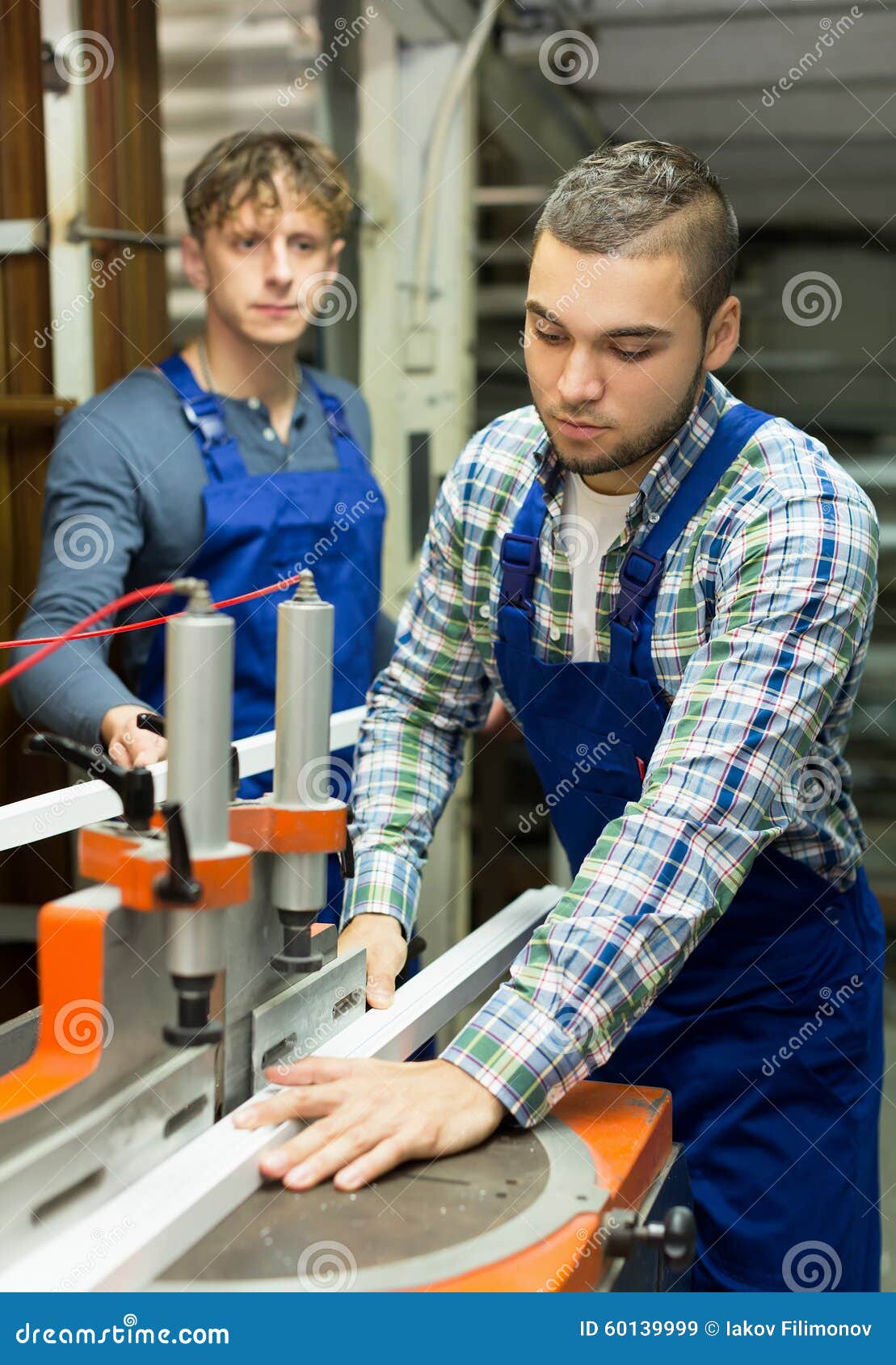 Two Workers Working on a Machine Stock Image - Image of polymer ...