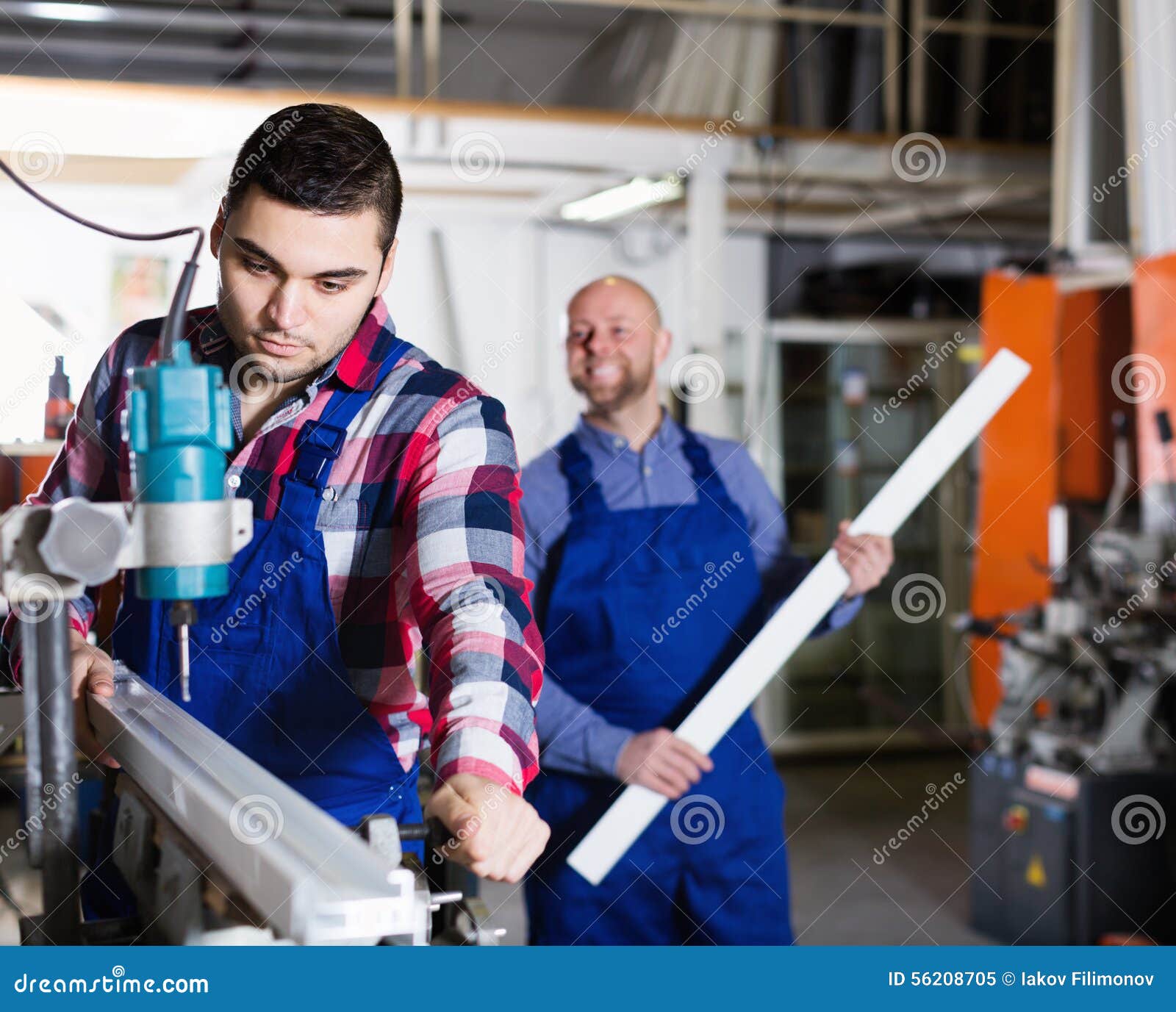 Two Workers Working on Machine Stock Image - Image of factory ...