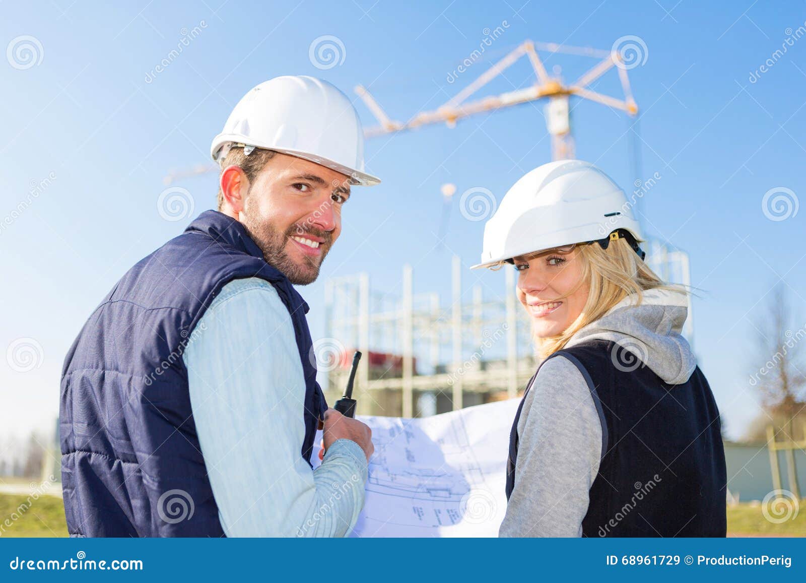 Two Workers Working Outside on a Construction Site Stock Image - Image ...