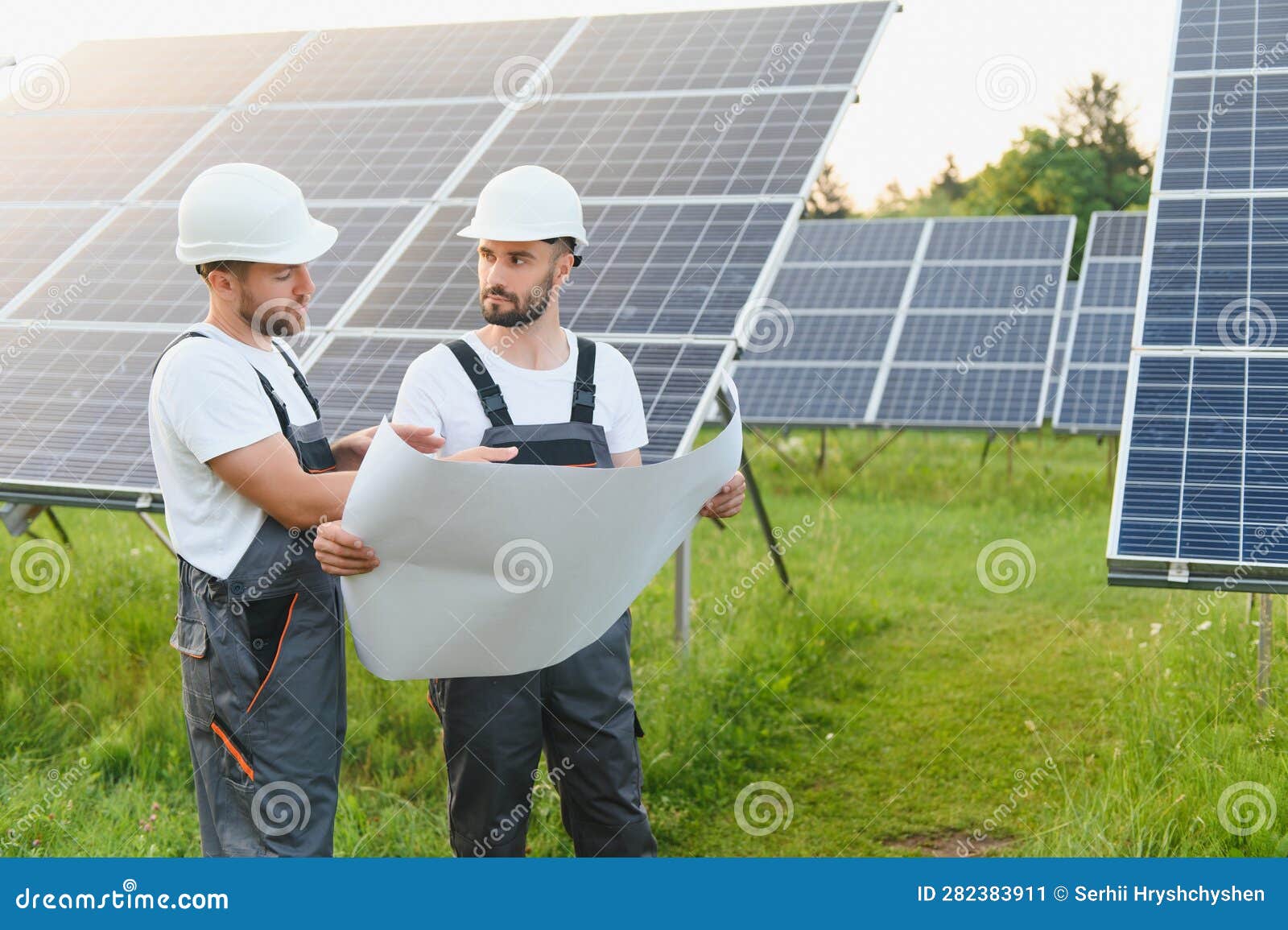Two Workers Working on a Solar Panel Stock Image - Image of sunlight ...