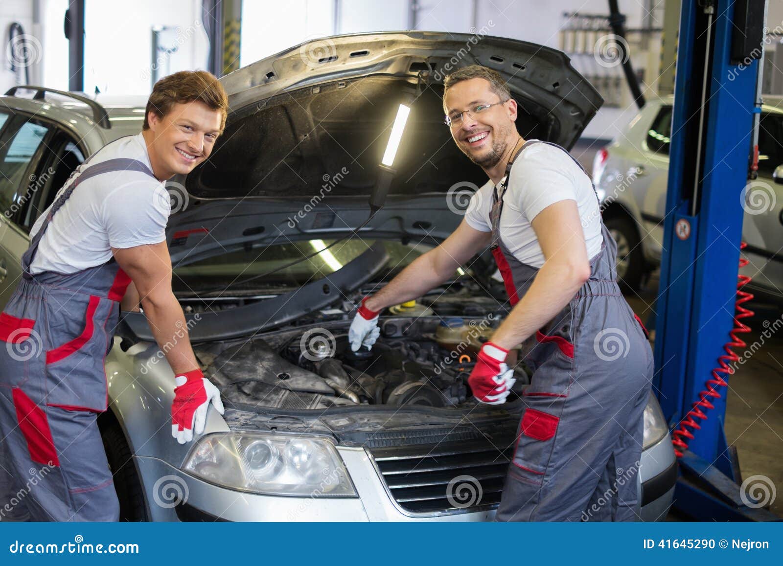 Two workers in a workshop stock photo. Image of checking - 41645290
