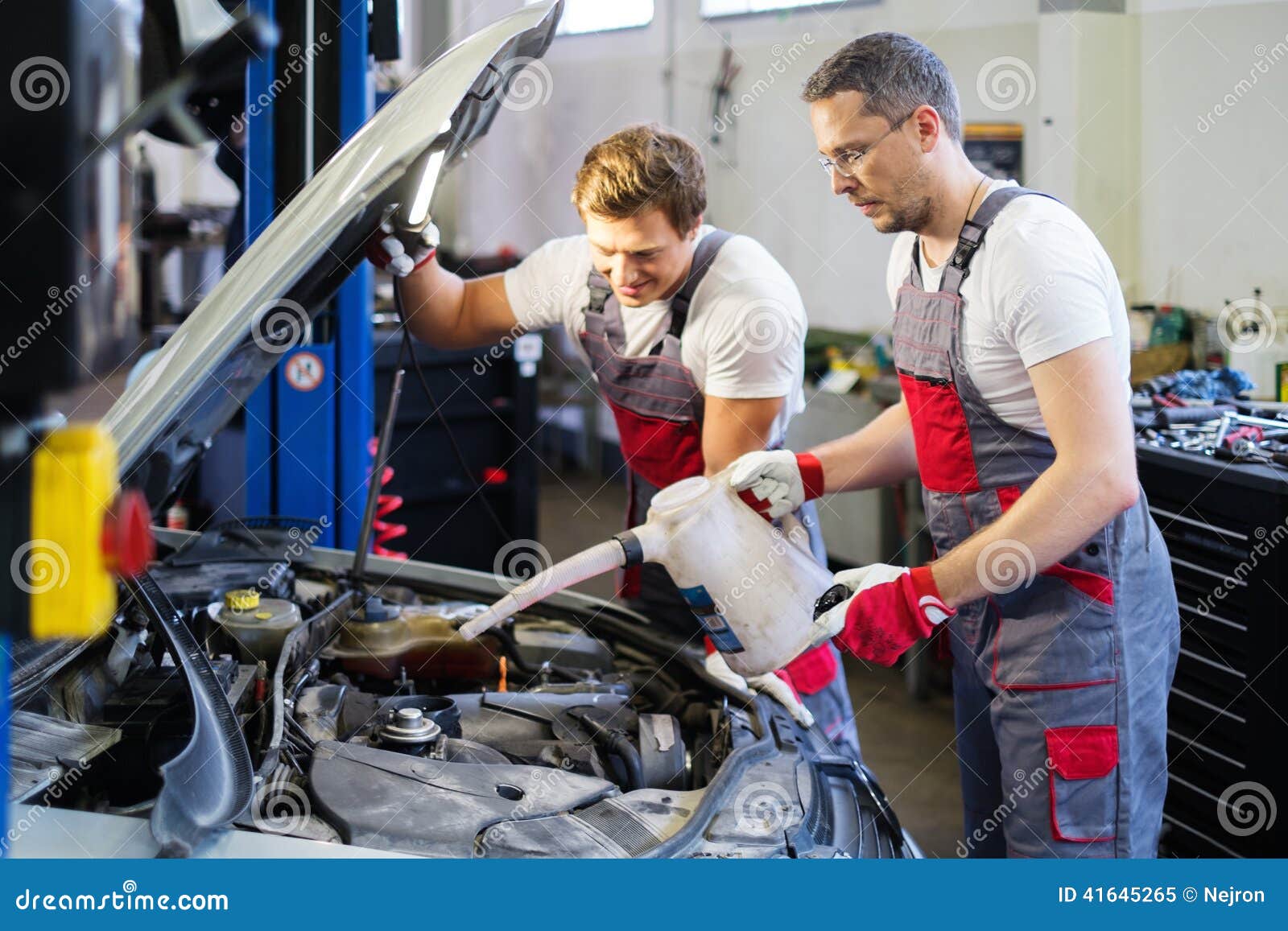 Two workers in a workshop stock image. Image of industry - 41645265