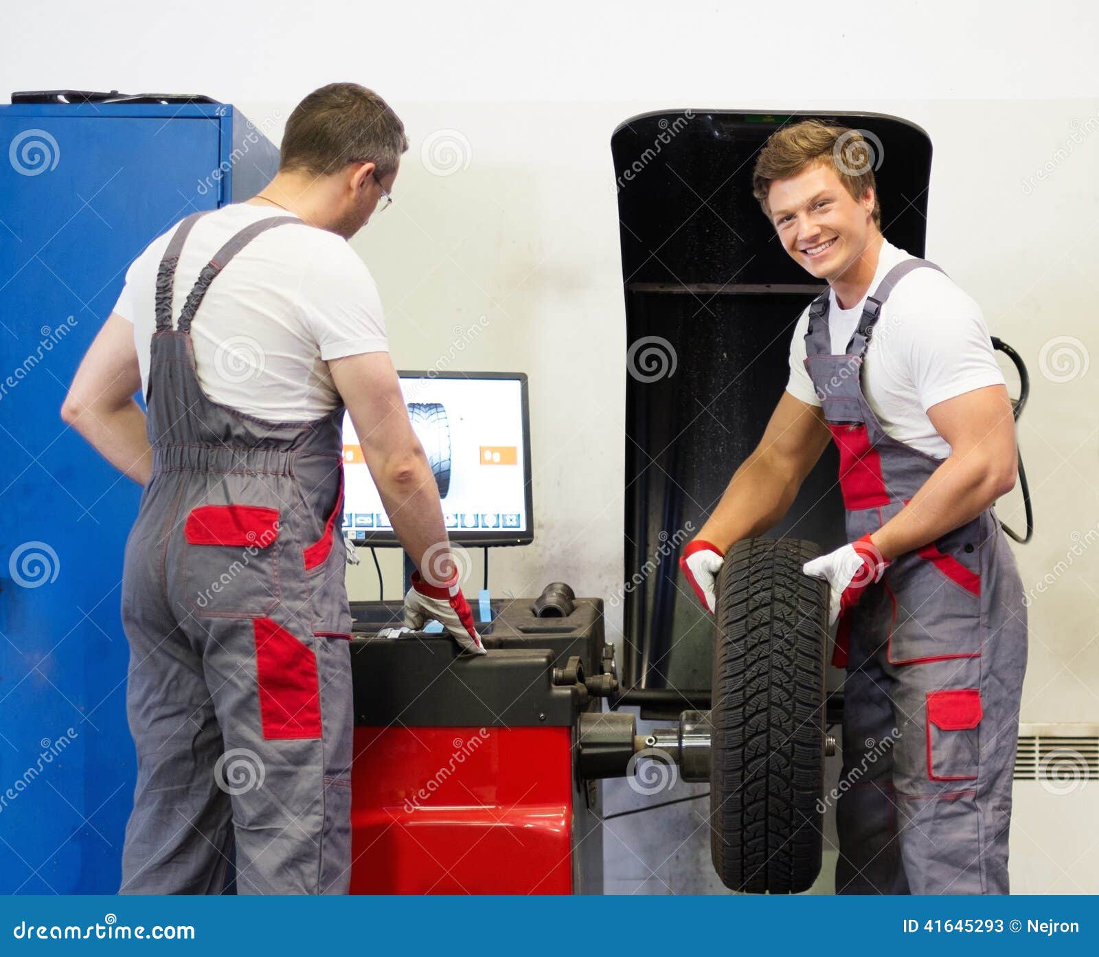 Two workers in a workshop stock image. Image of fixing - 41645293