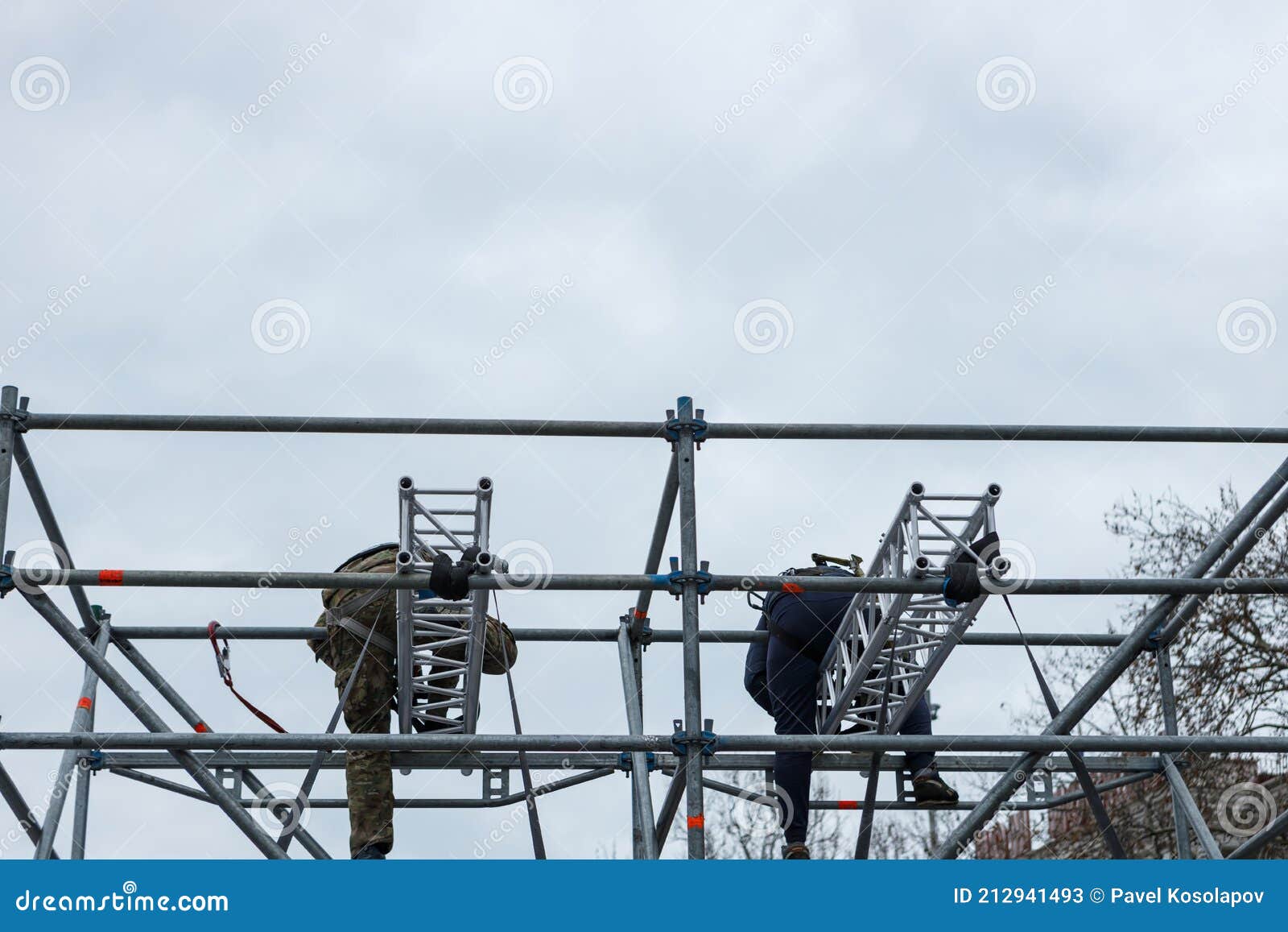 Two Working High-rise Workers Mount Metal Structures Stock Image ...