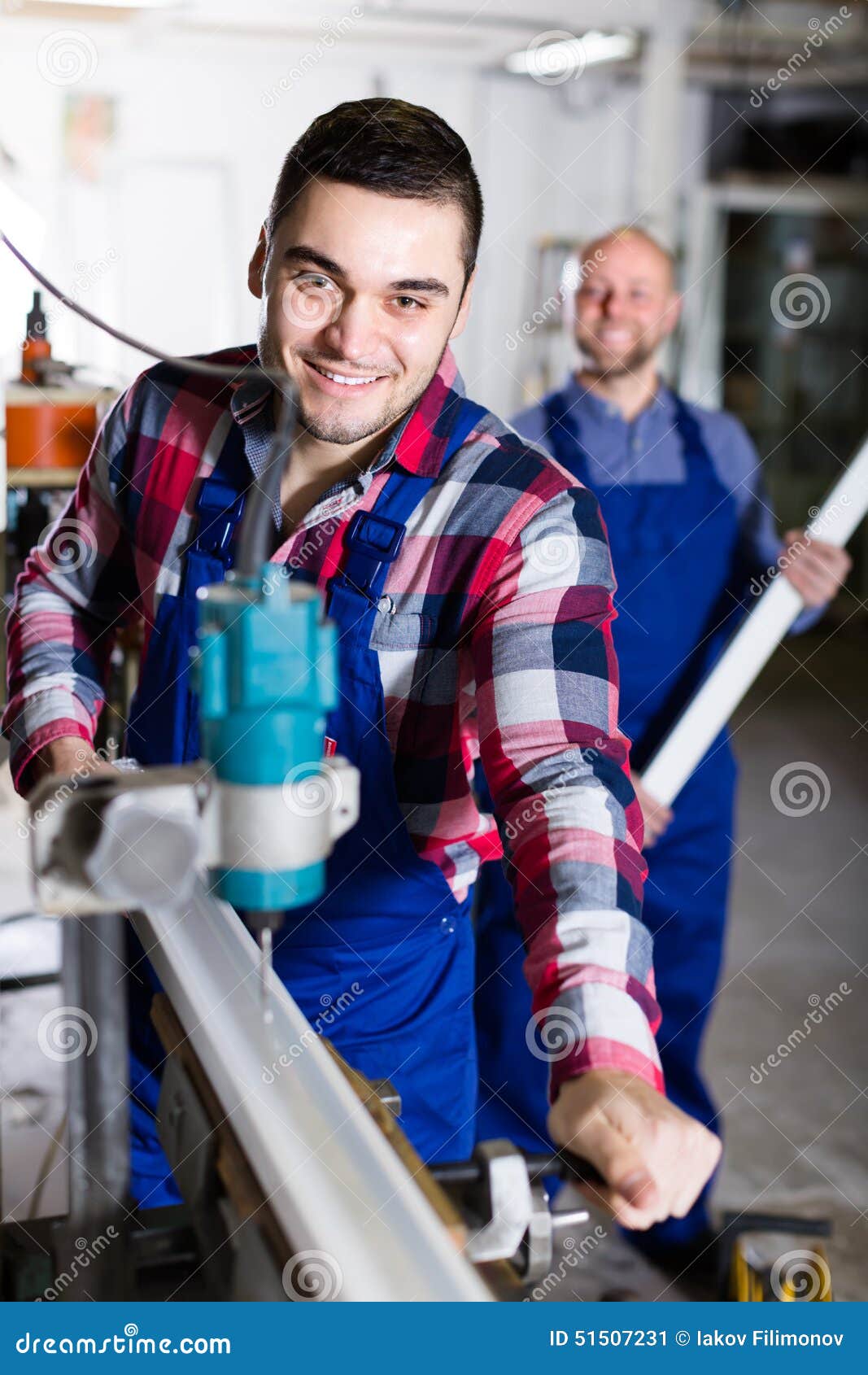 Two workmen in PVC shop stock image. Image of hand, caucasian - 51507231