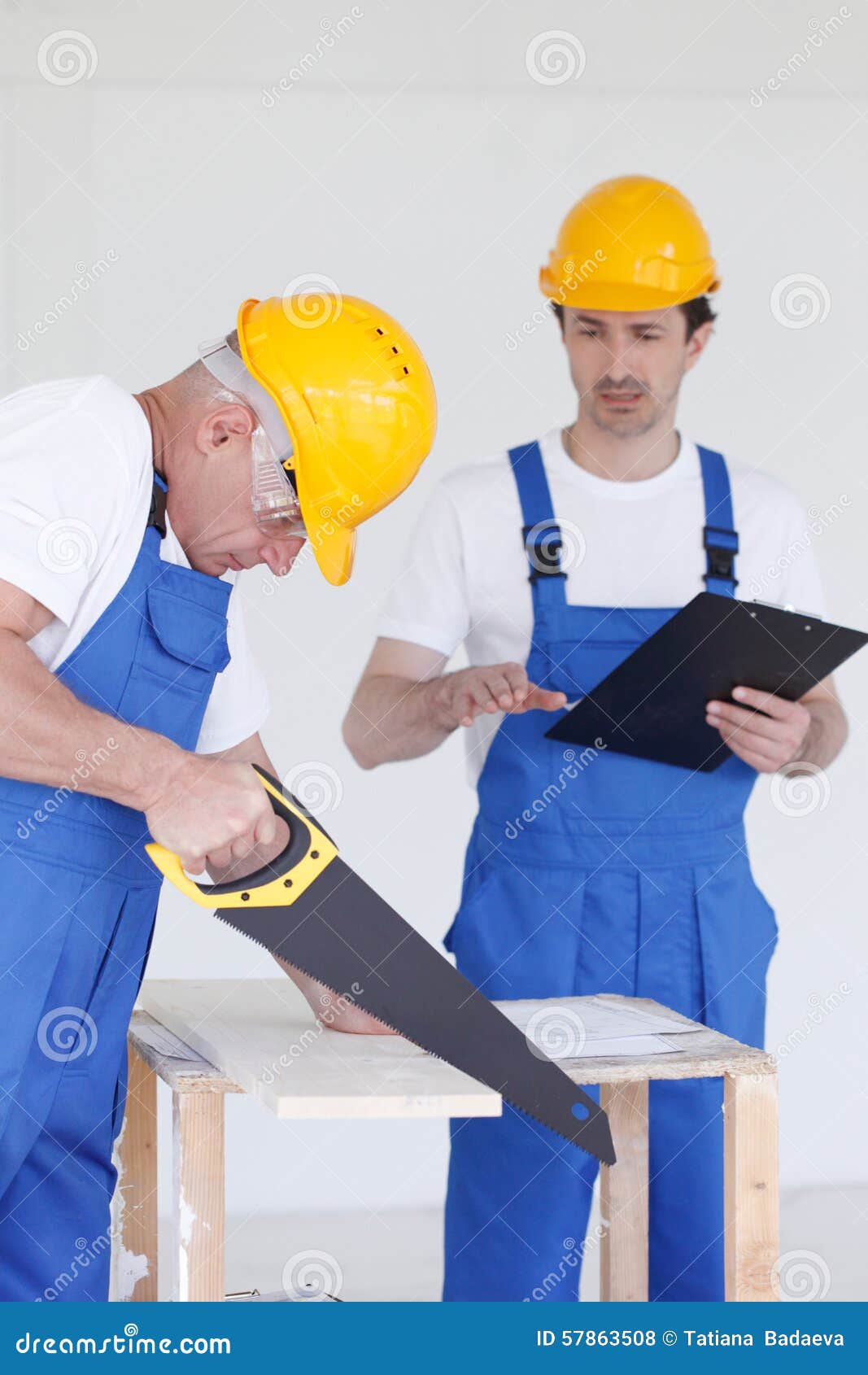 Two workmen stock photo. Image of equipment, wooden, contract - 57863508
