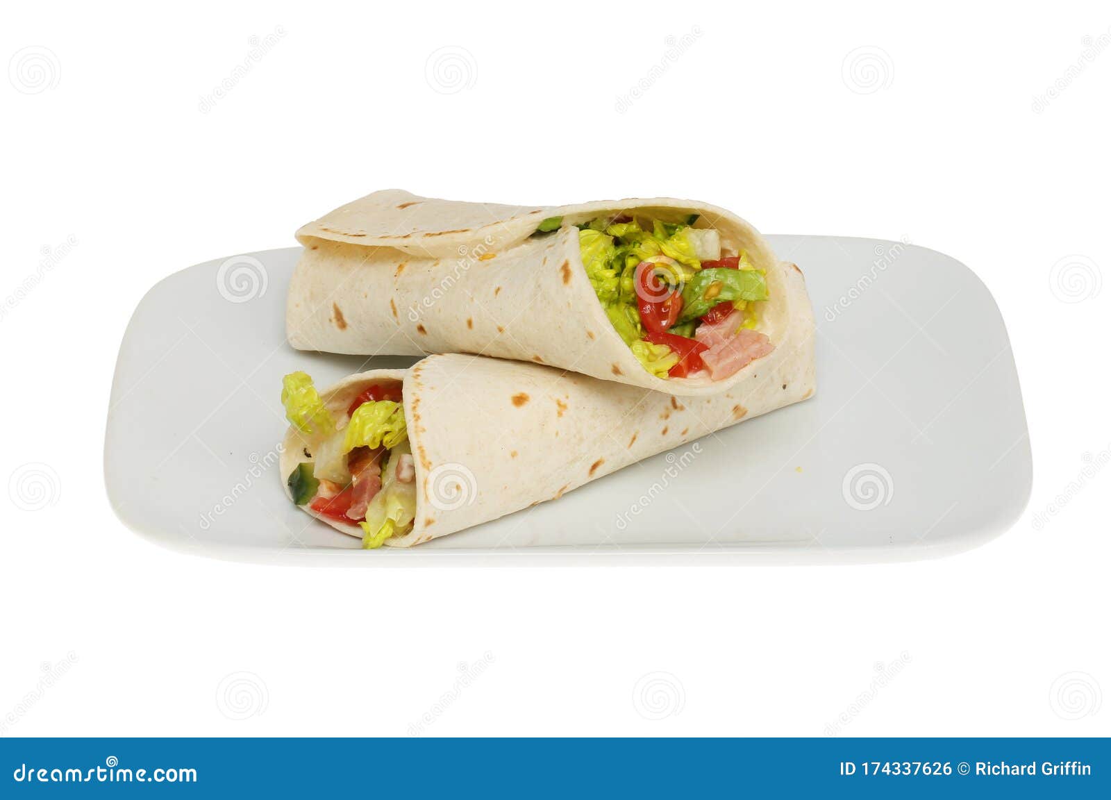 Two wraps on a plate stock photo. Image of bread, tomato - 174337626