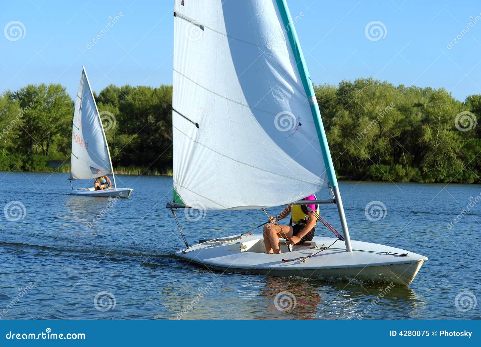 Two yachts race on river stock image. Image of nautical - 4280075