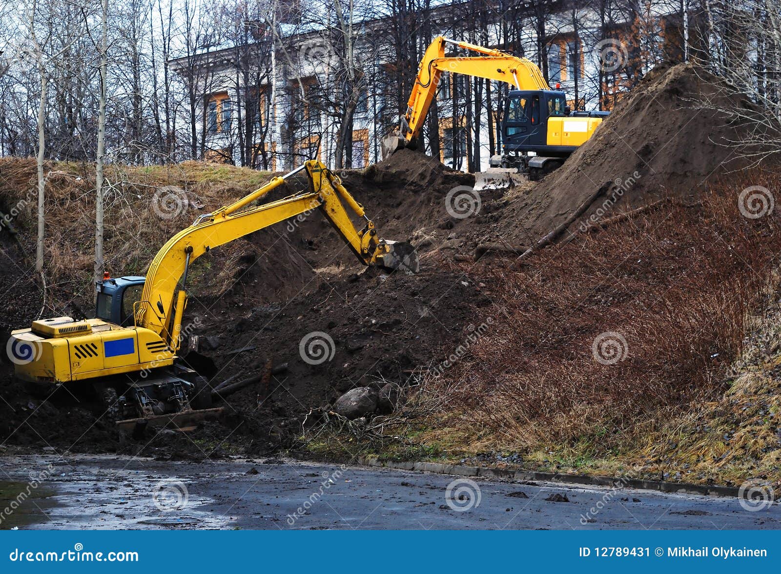 Two Yellow Earth-moving Machines Stock Image - Image of machinery ...