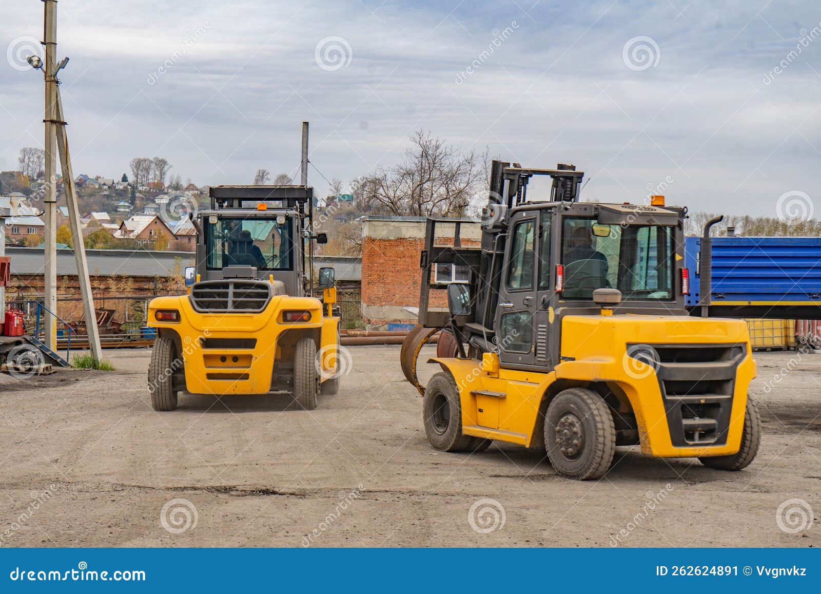 Two Yellow Forklifts while Working on Cargo Transportation Stock Image ...
