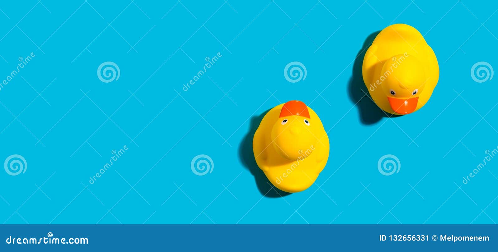 Two yellow rubber ducks stock image. Image of concept - 132656331