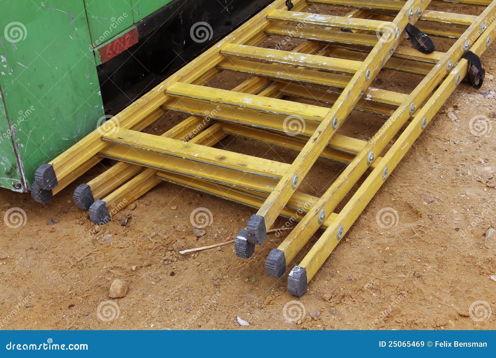 Two yellow wooden ladders stock image. Image of wooden - 25065469
