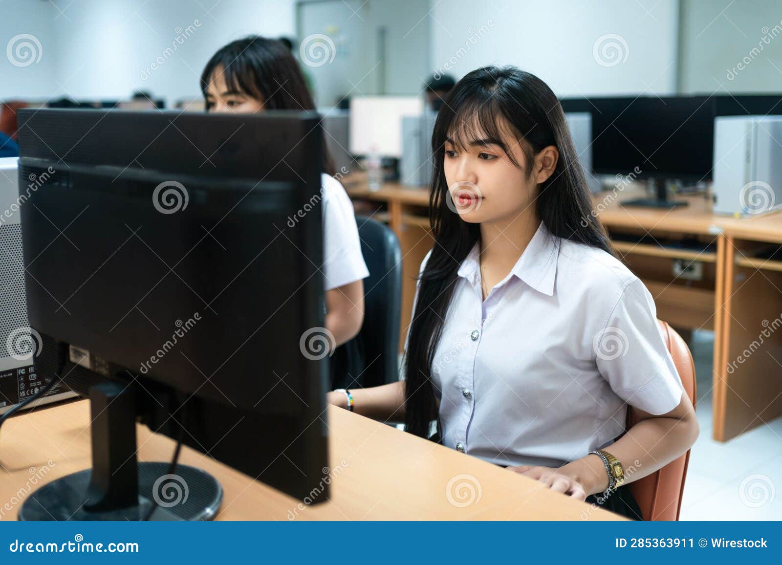 Two Asian Female Students in Front of a Computer Stock Image - Image of ...