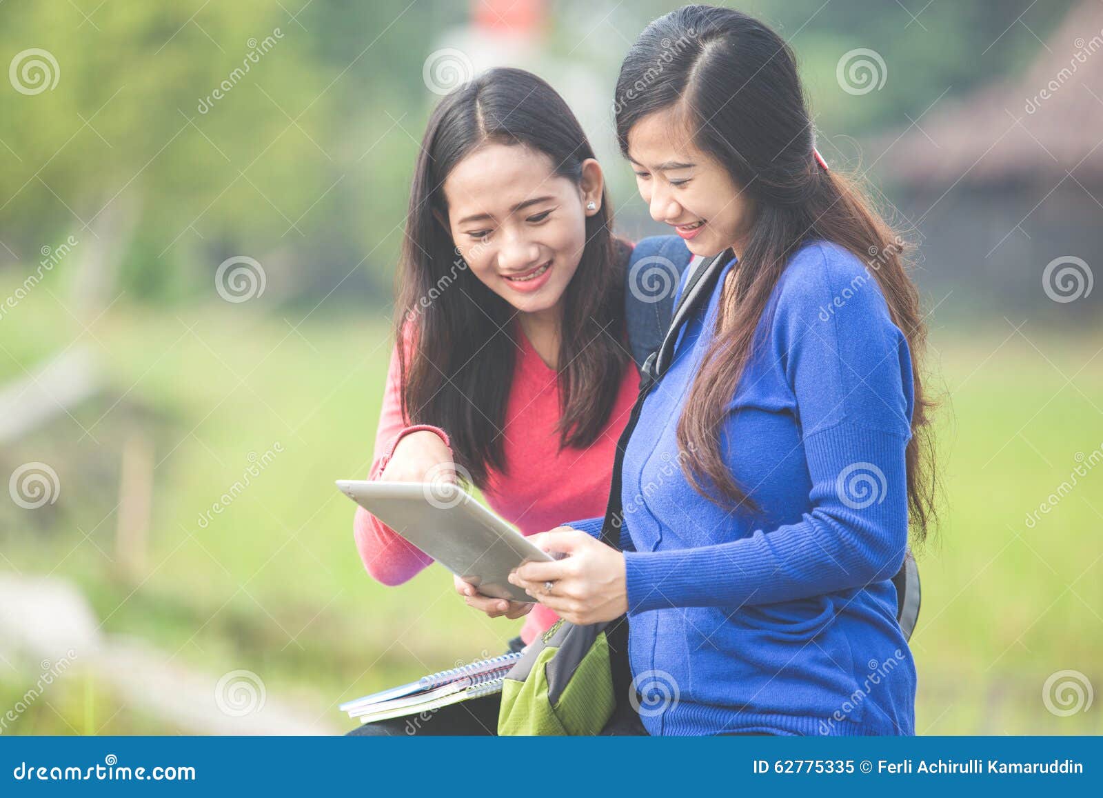 Two Young Asian Students Using Tablet Pc Stock Image - Image of ebooks ...