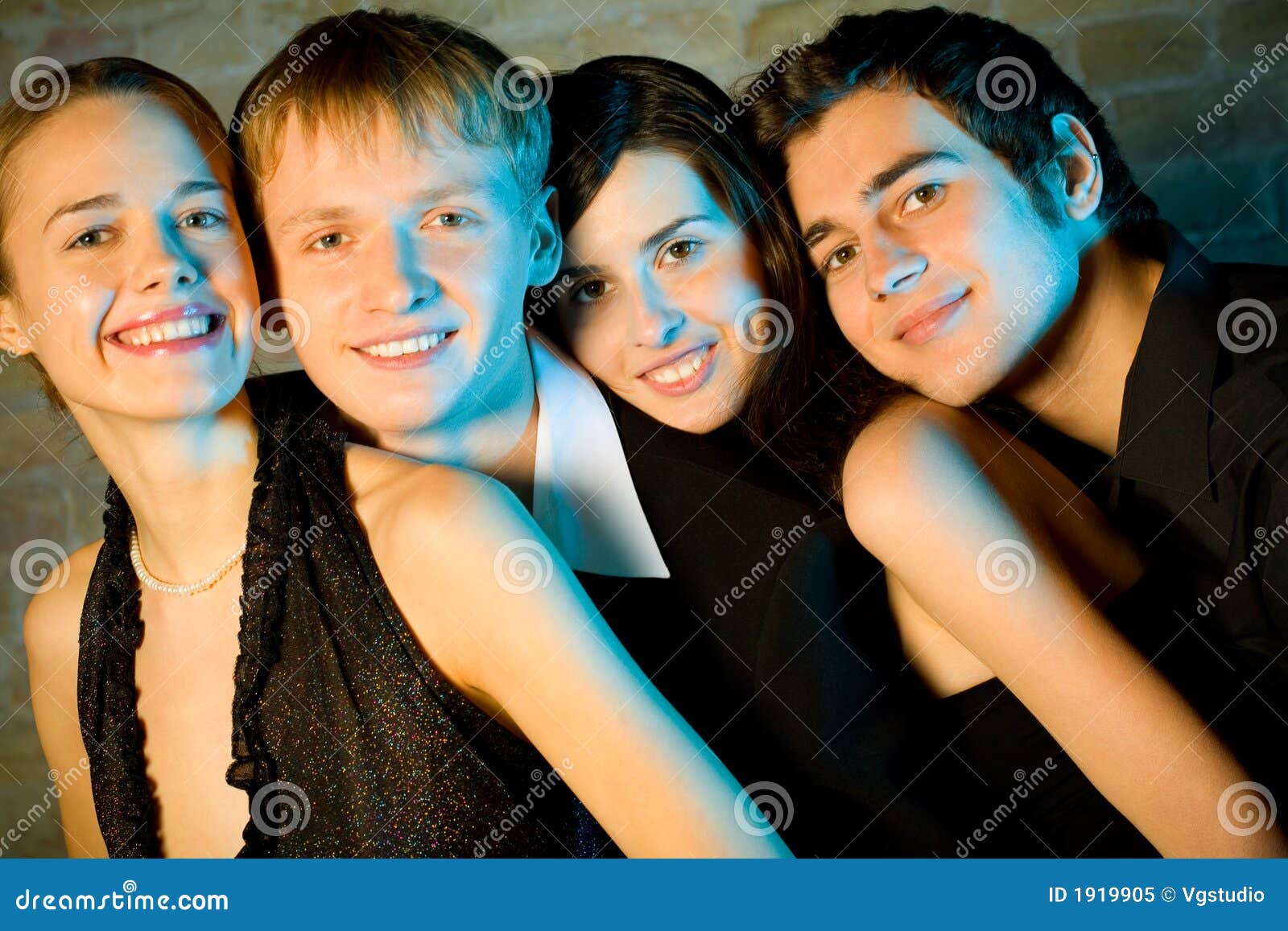 Two Young Attractive Smiling Couples or Friends at a Party Stock Image ...