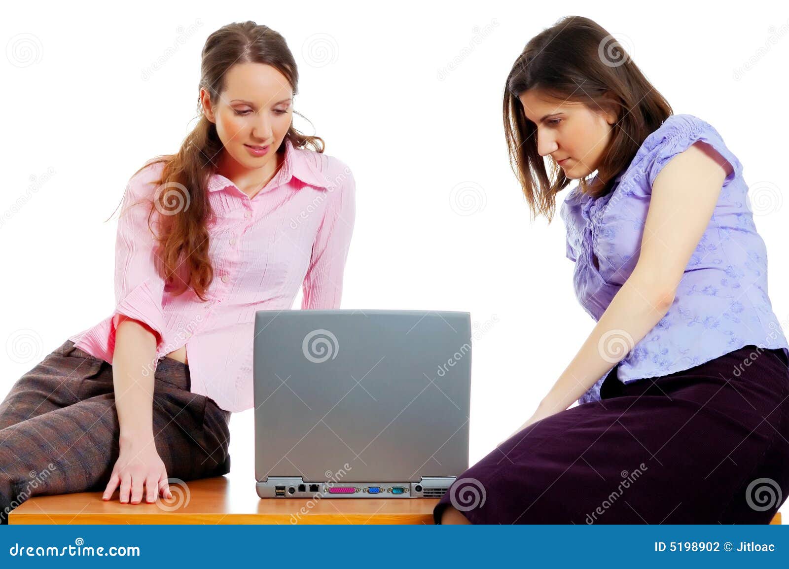Two Young Attractive Women with a Computer Stock Photo - Image of ...