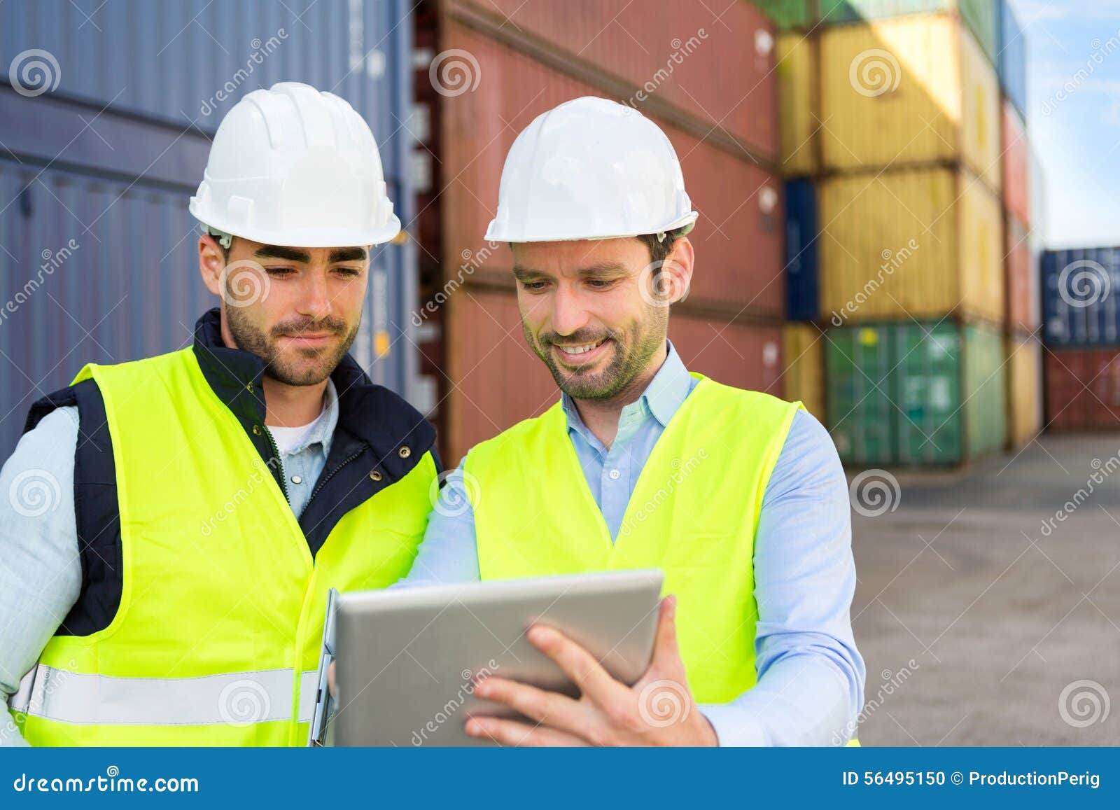 Engineer Dockers Wearing Safety Coat And Holding A Helmet Stock Photo ...