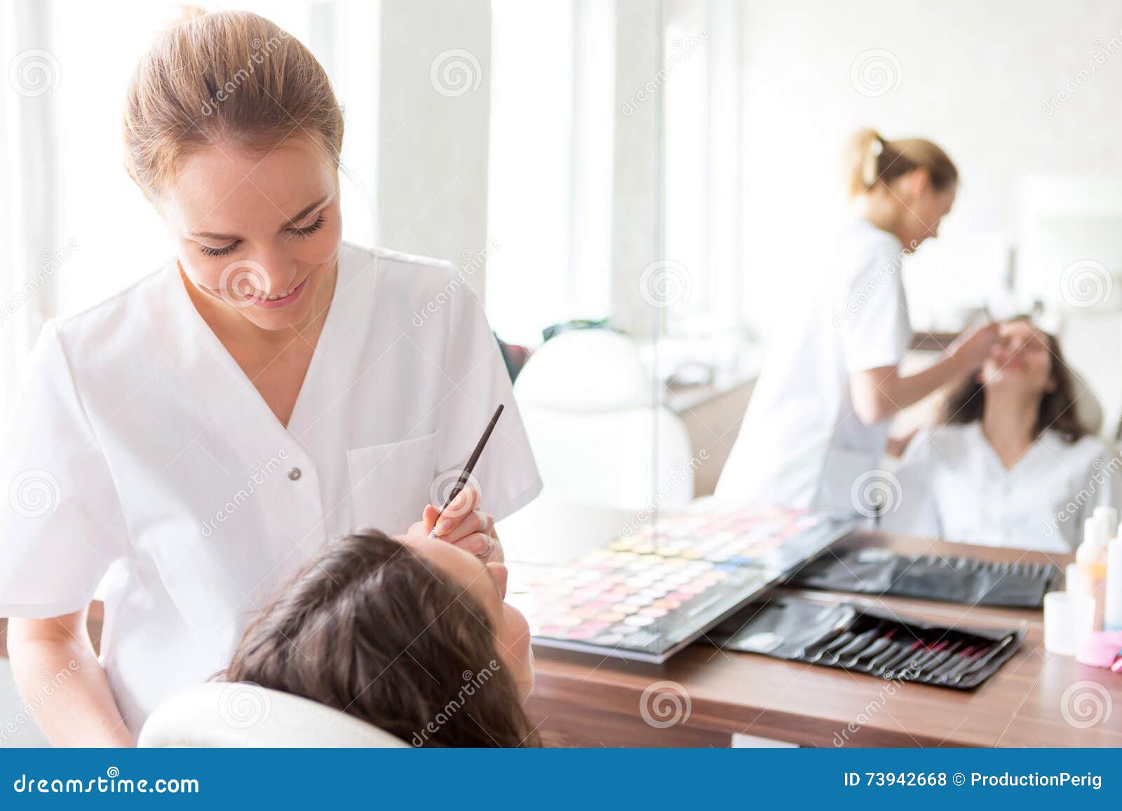 Two Young Beautician Students Working during Make Up Classes Stock ...