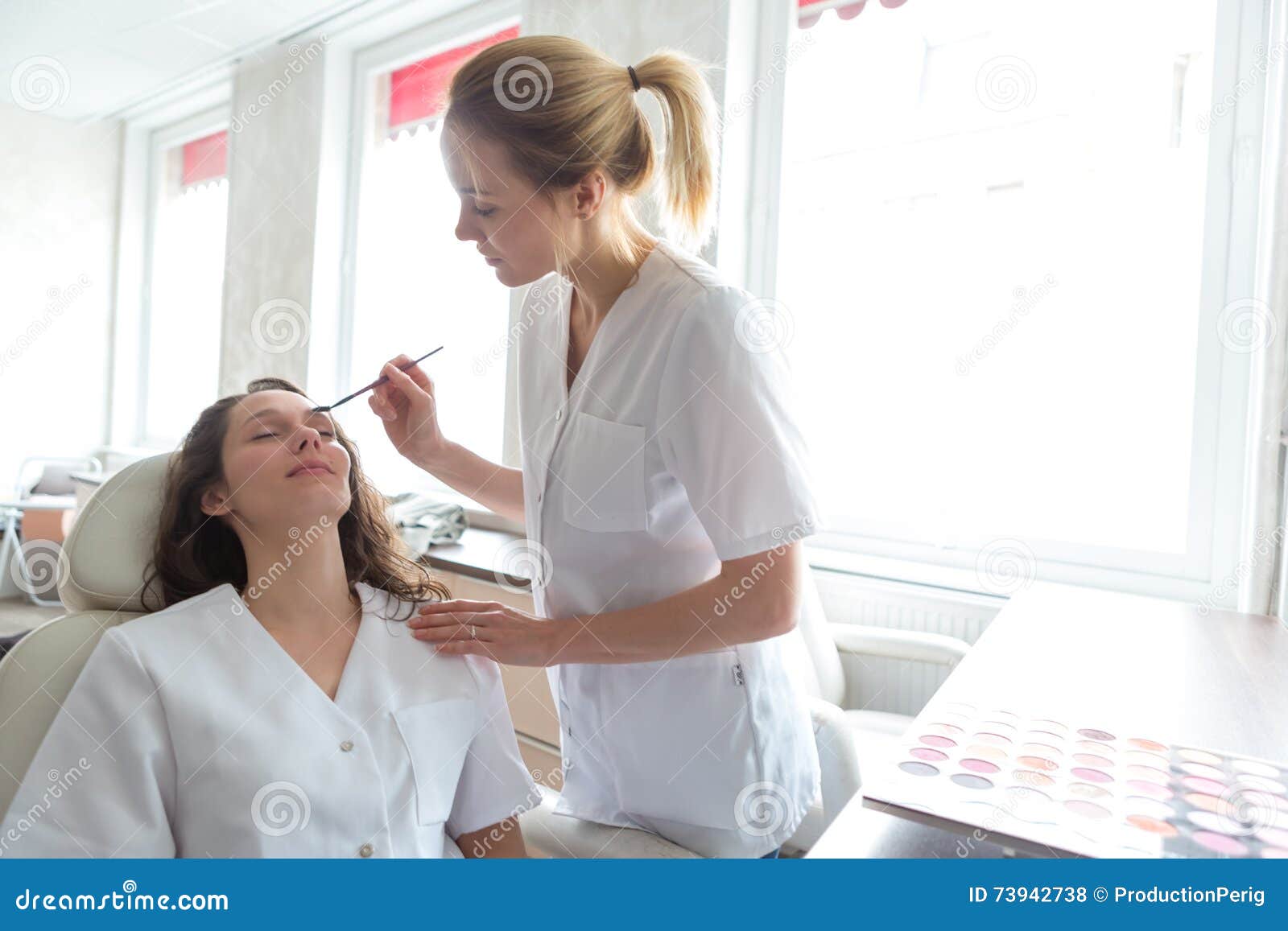 Two Young Beautician Students Working during Make Up Classes Stock ...
