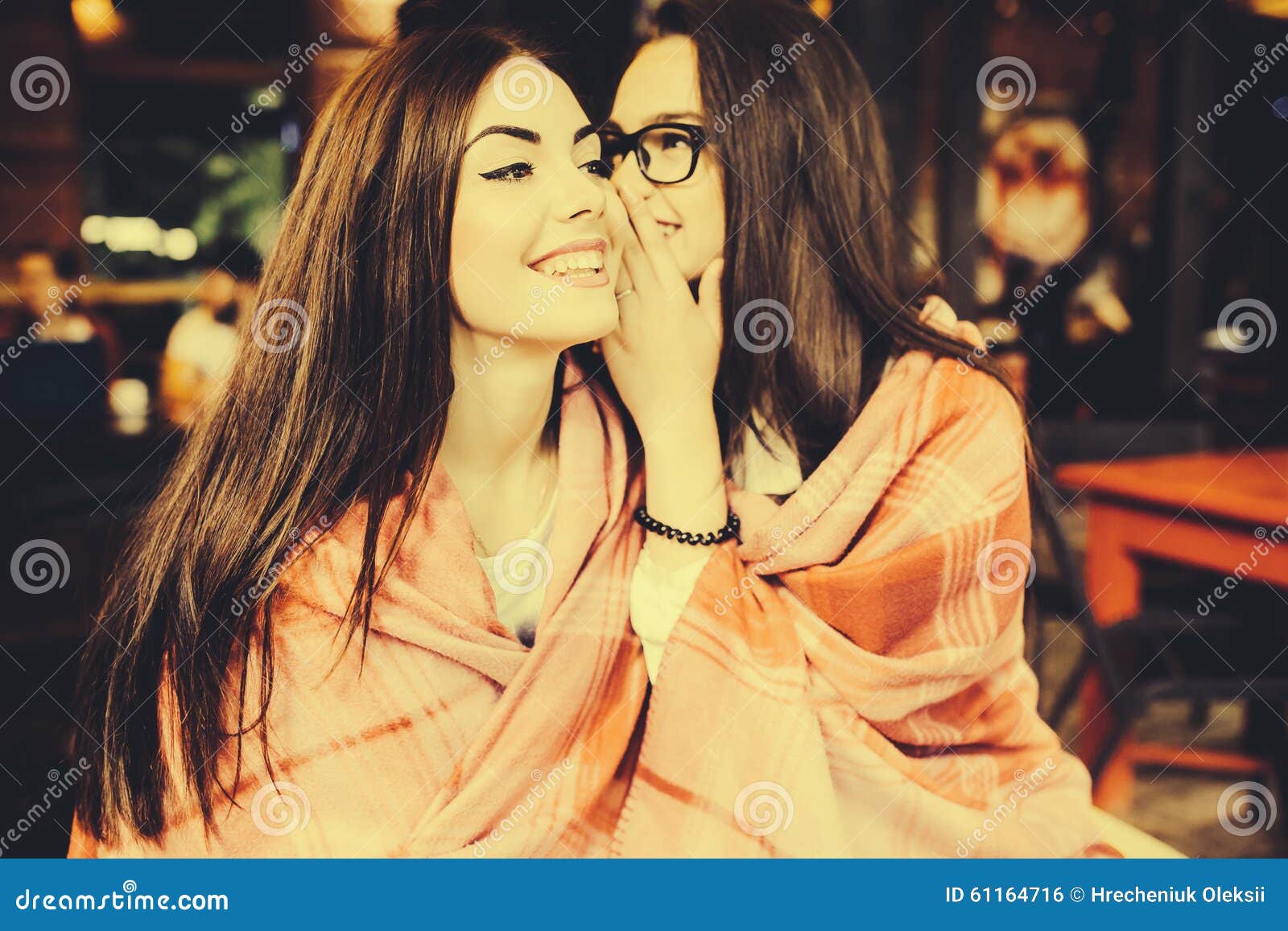 Two Young and Beautiful Girls Share Secrets Stock Photo - Image of girl ...