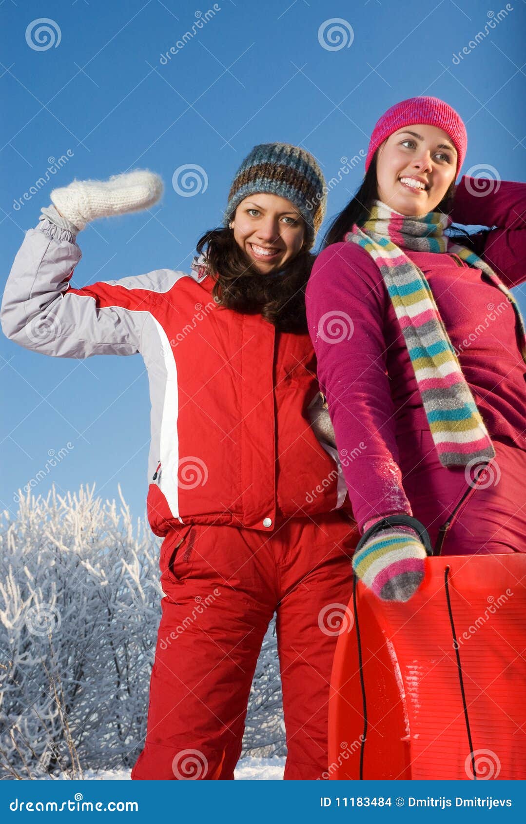 Two Young Beautiful Girls with Sledges Stock Photo - Image of colorful ...