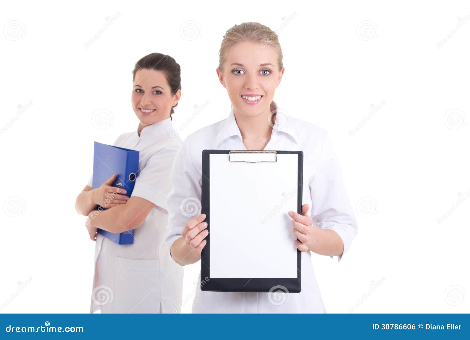 Two Young Beautiful Nurses with Folders. Copyspace Stock Photo - Image ...