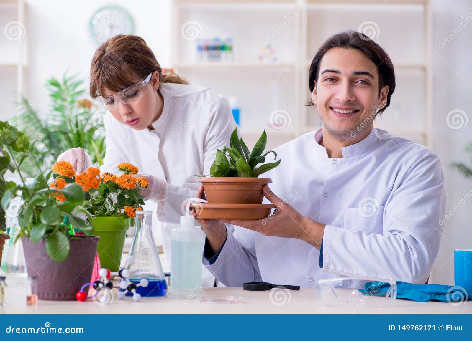 Two Young Botanist Working in the Lab Stock Image - Image of pots ...