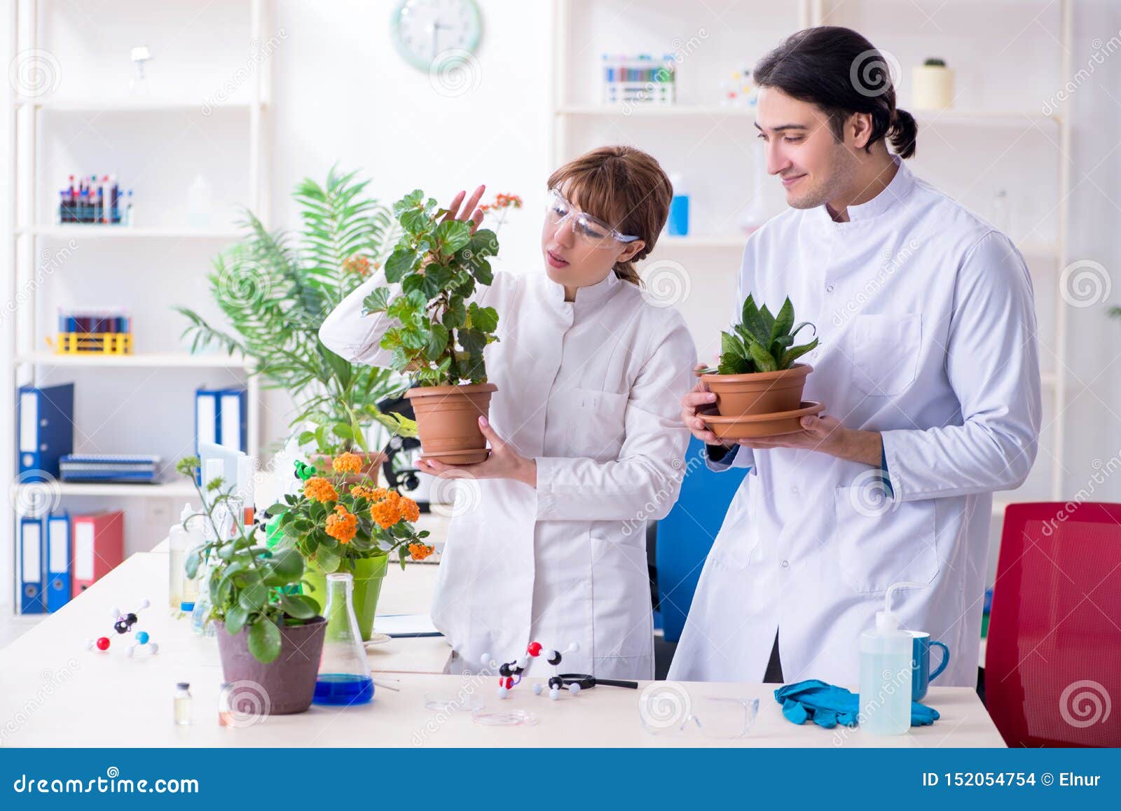 Two Young Botanist Working in the Lab Stock Photo - Image of botanist ...