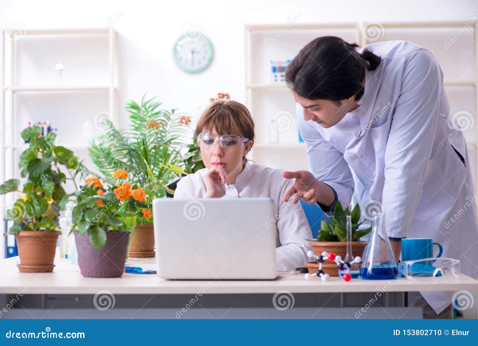 Two Young Botanist Working in the Lab Stock Photo - Image of green ...