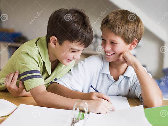 Two Young Boys Doing Their Homework Together Stock Photo - Image of ...