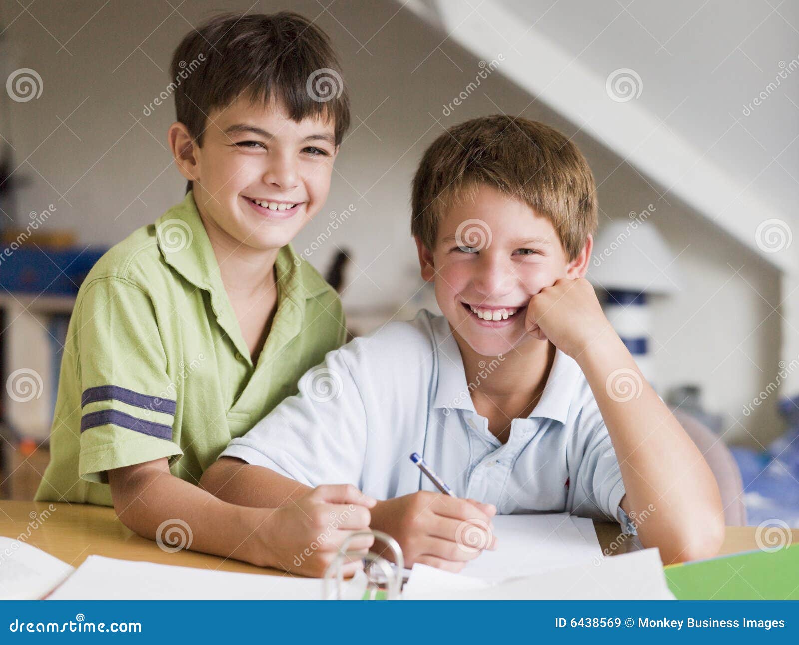 Two Young Boys Doing Their Homework Together Stock Image - Image of ...
