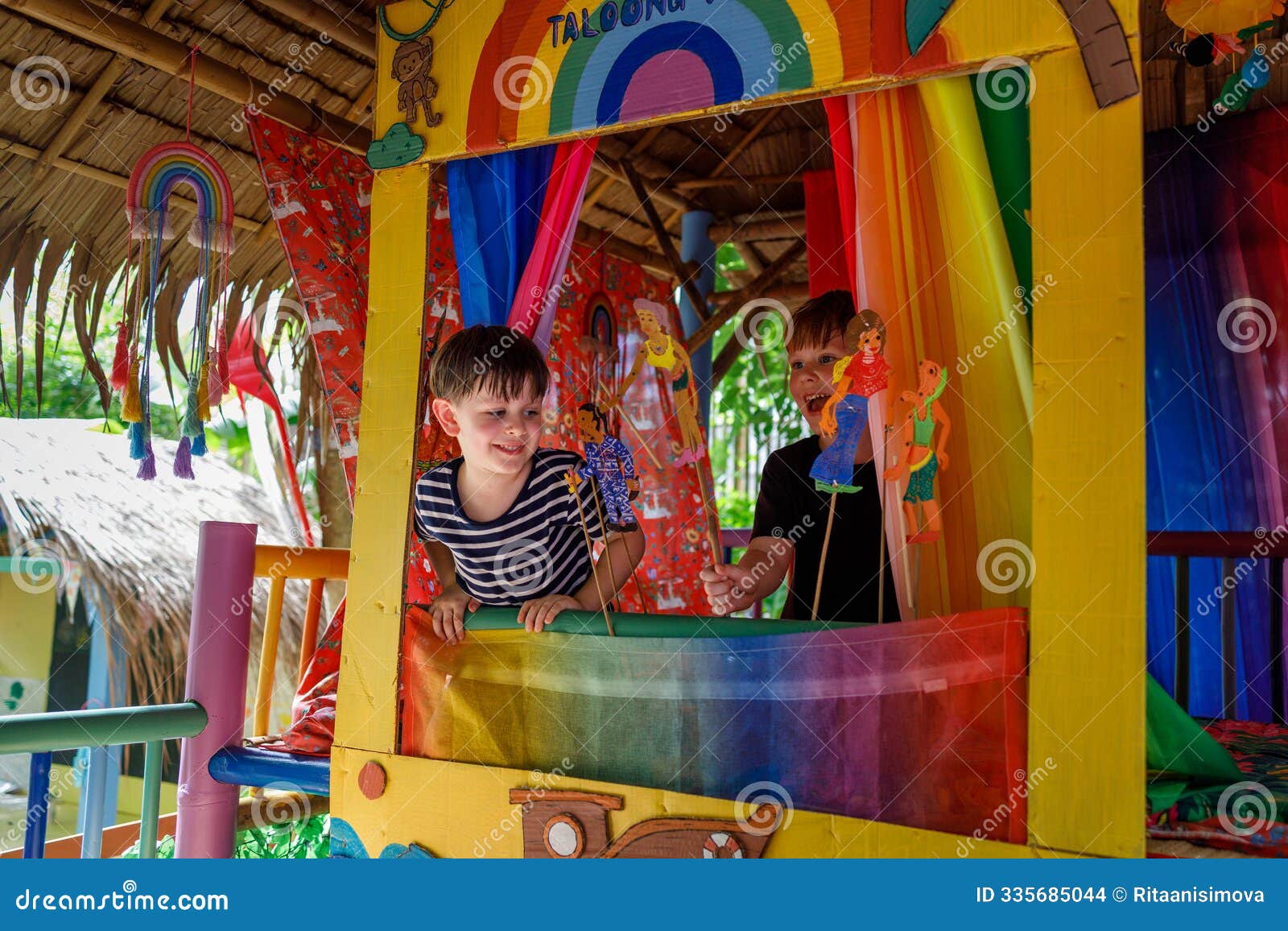 Two Young Boys Enthusiastically Perform a Puppet Show Stock Photo ... Two Young Boys Enthusiastically Perform a Puppet Show Stock Photo ...