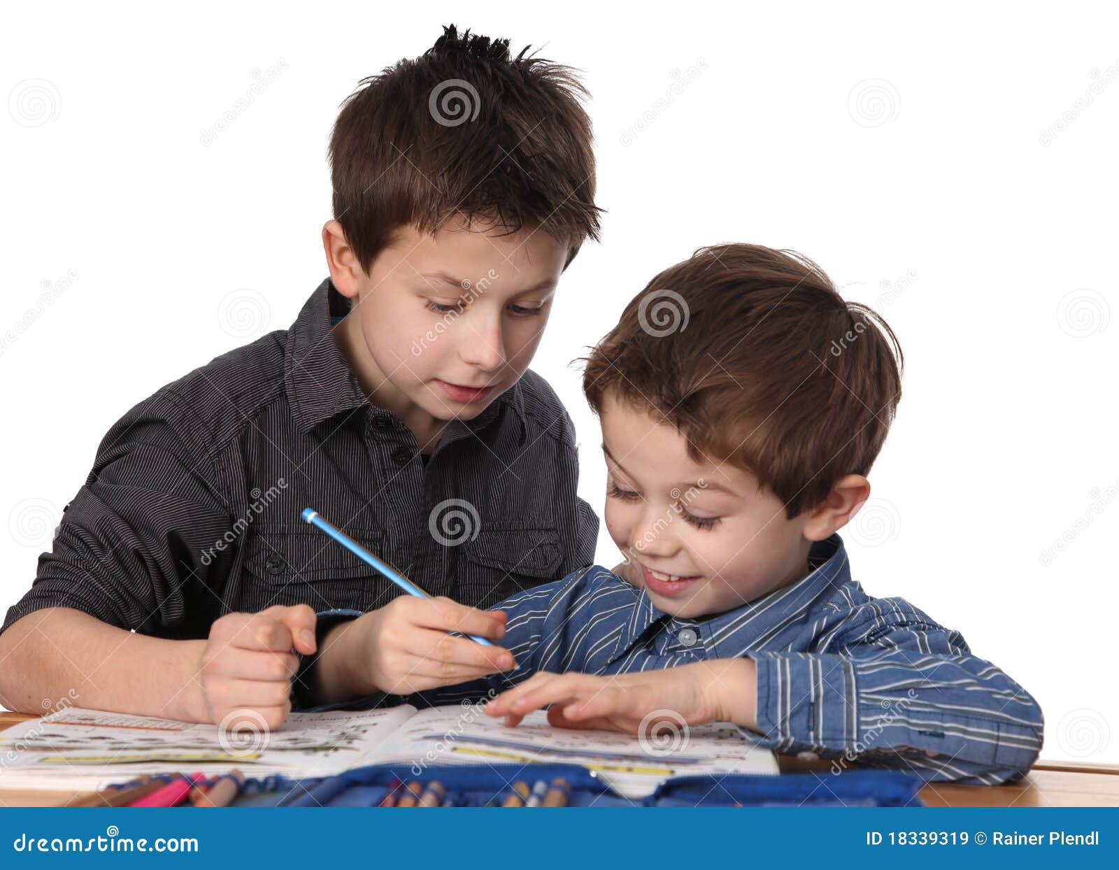 Two young boys learning stock image. Image of homework - 18339319
