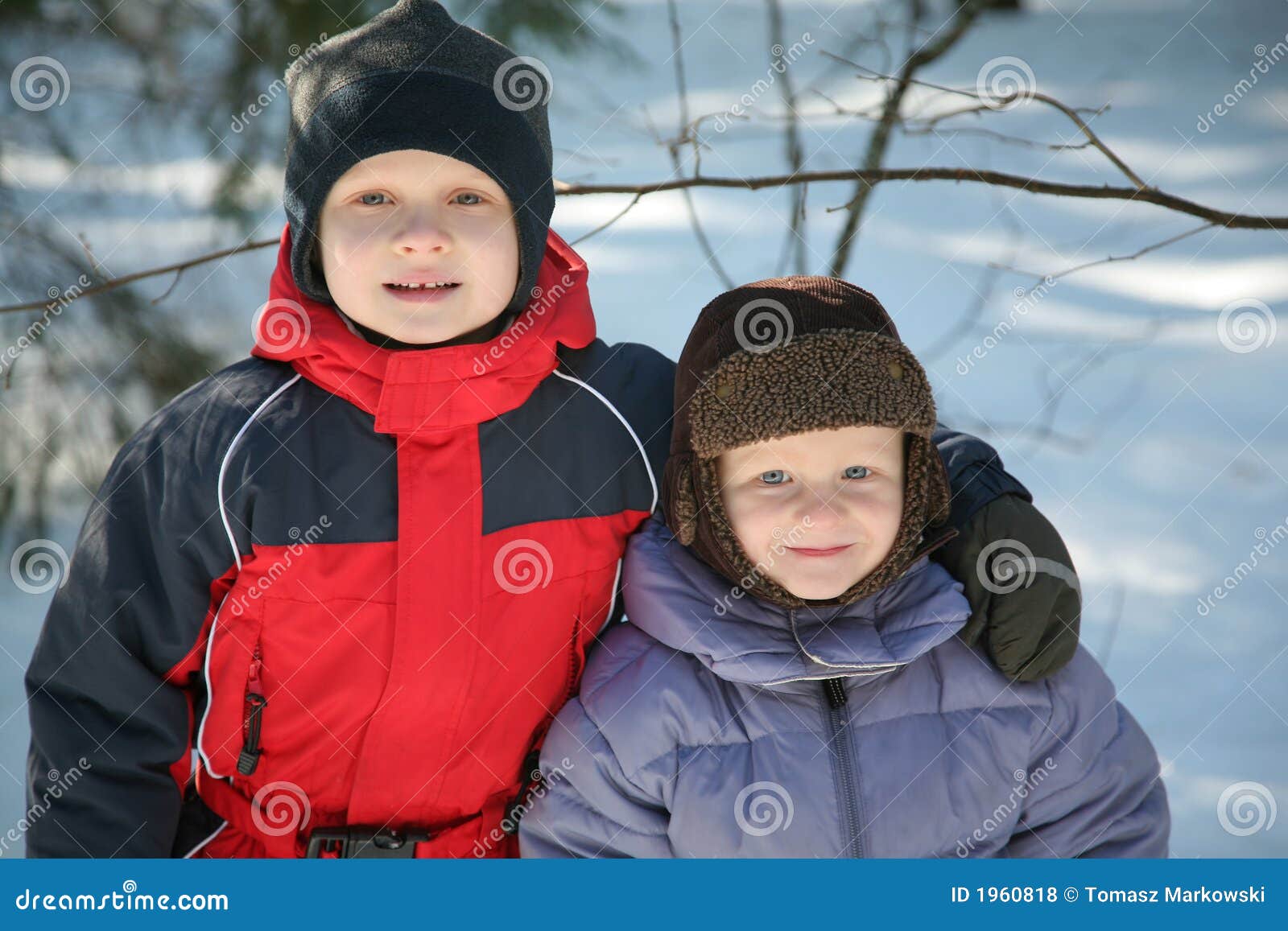 Boys Both Help Each Other With A Headband And Their Friends Put Up A ...