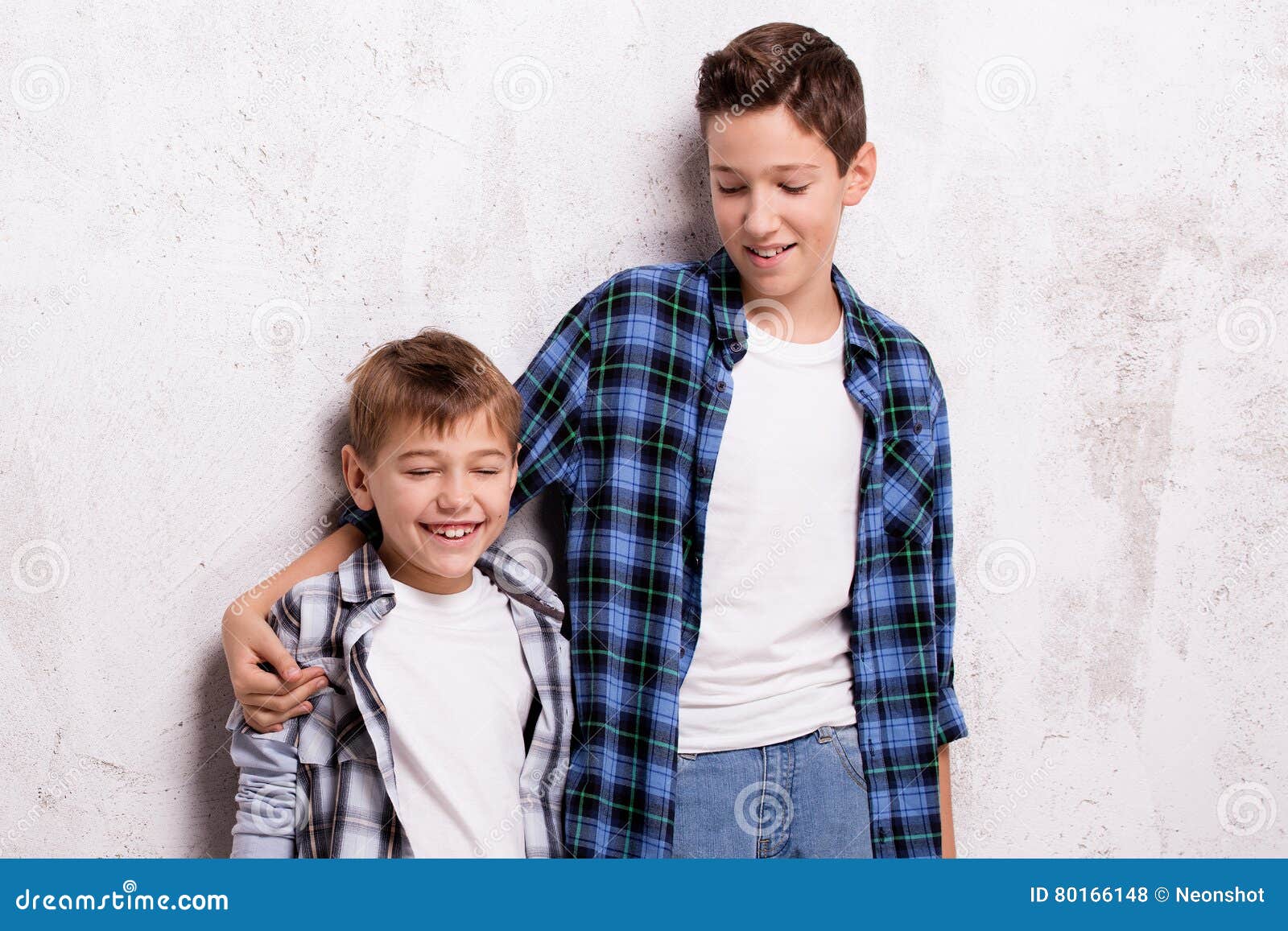 Two young brothers posing. stock photo. Image of casual - 80166148