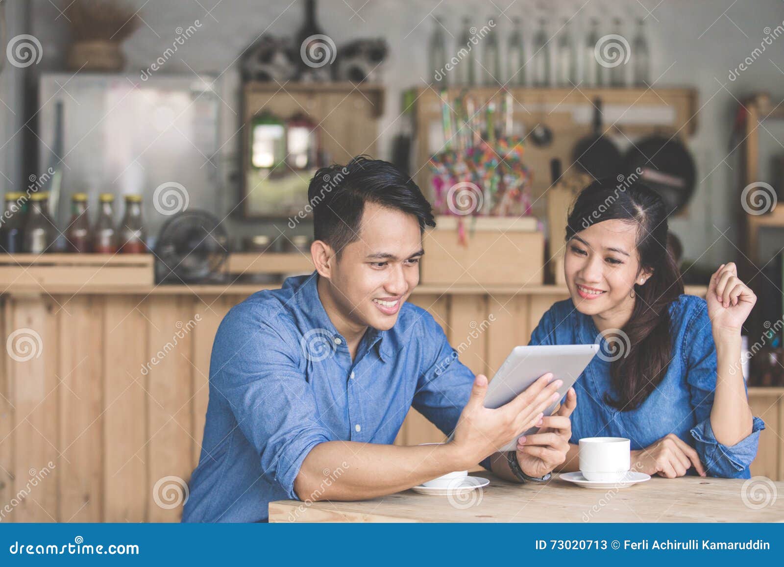 Two Young Business Partner Using Tablet Together Stock Image - Image of ...