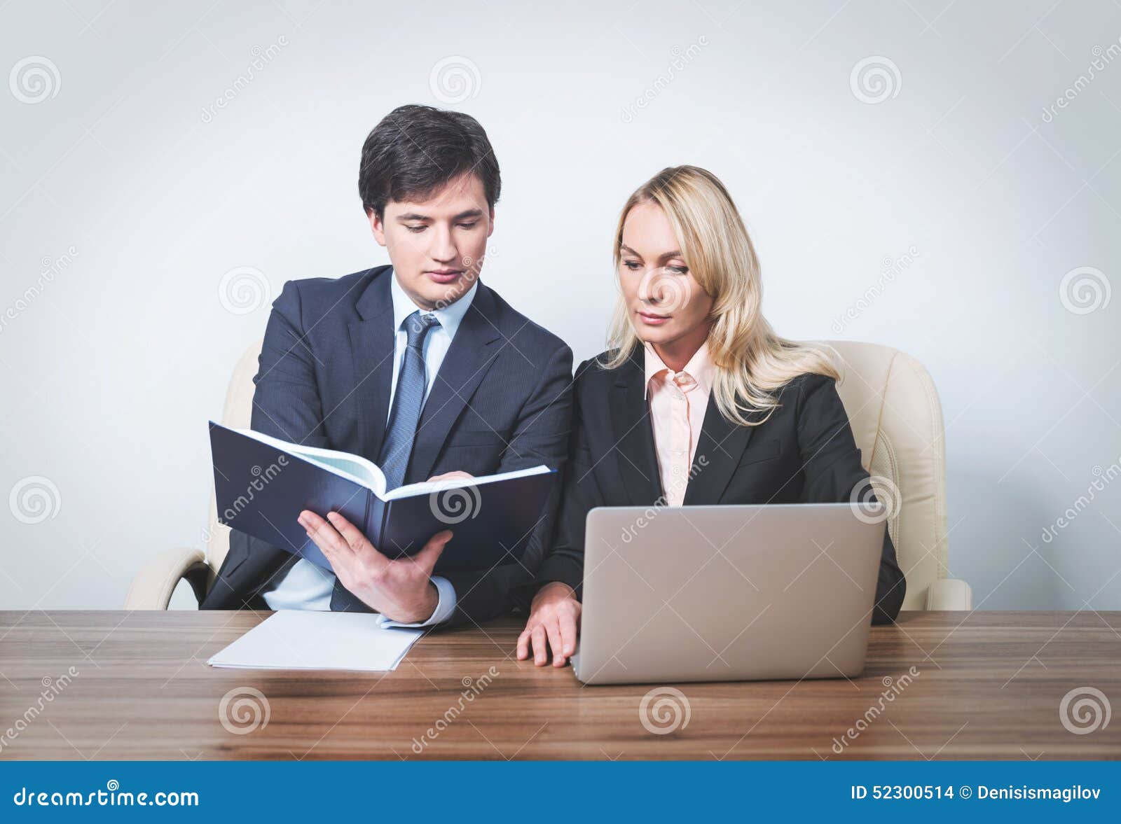 Two Young Business Partners at Meeting Stock Photo - Image of ...