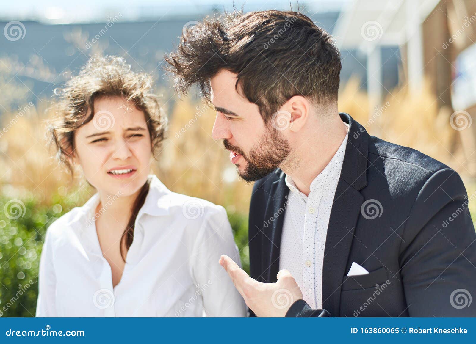 Two Young Business People As a Team in Dialogue Stock Image - Image of ...